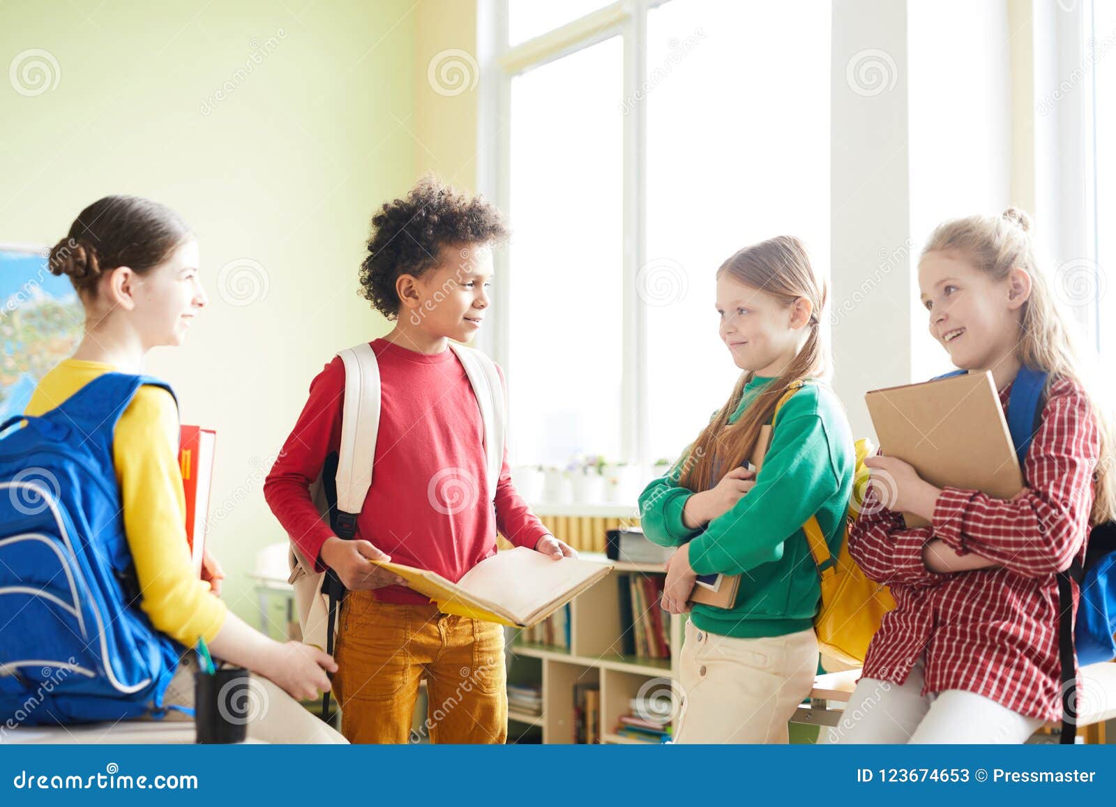 Elementary Students Discussing School Project Stock Image - Image of ...