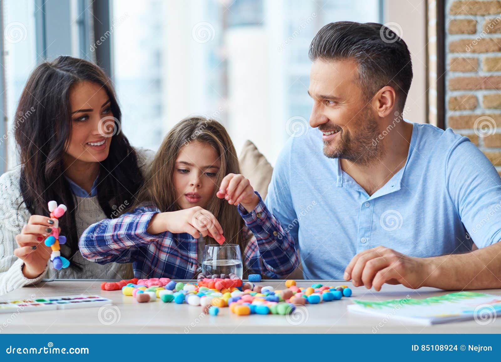 Cheerful Family Playing with Colored Set for Creativity Stock Photo ...