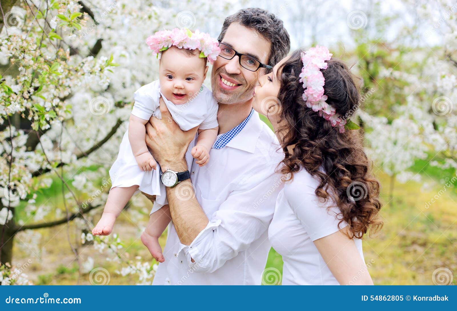 Cheerful Family in the Spring Orchard Stock Image - Image of mother ...