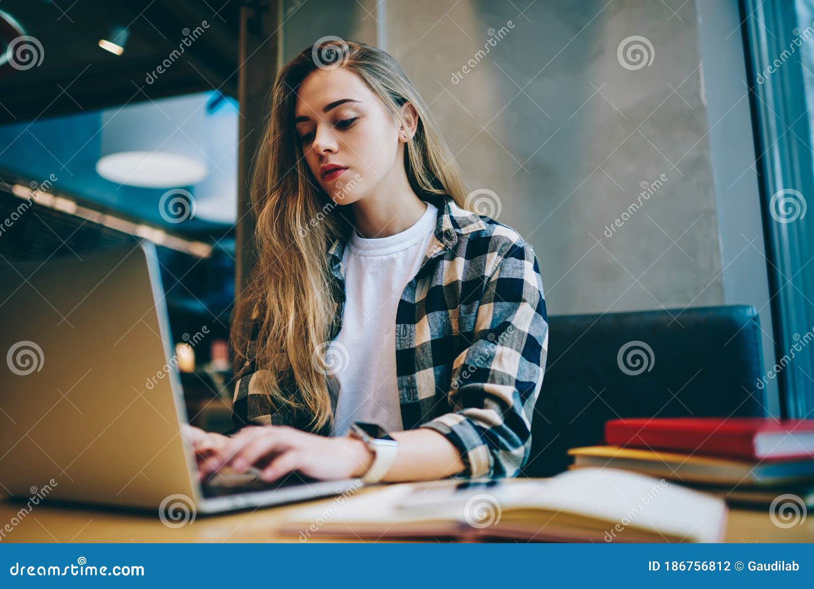 Cheerful Female it Developer Looking at Cafeteria Window after Work on ...