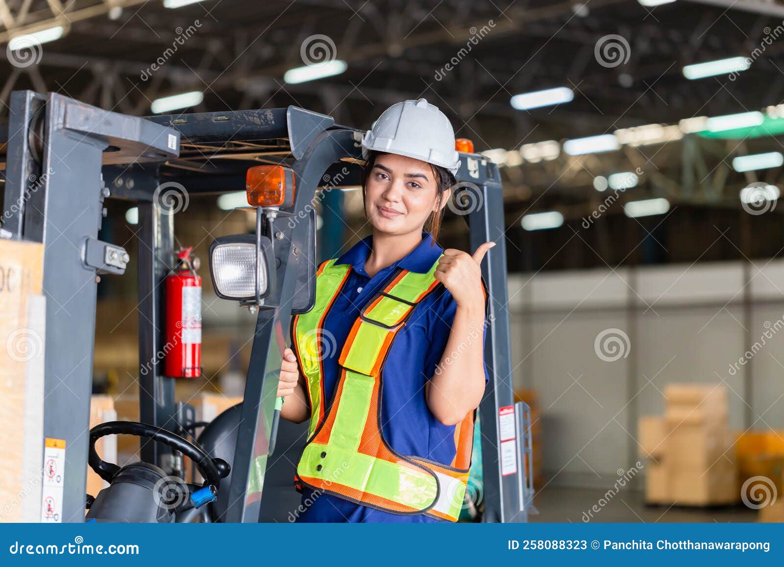 Cheerful Female Worker on Forklift, Manual Workers Working in Warehouse ...