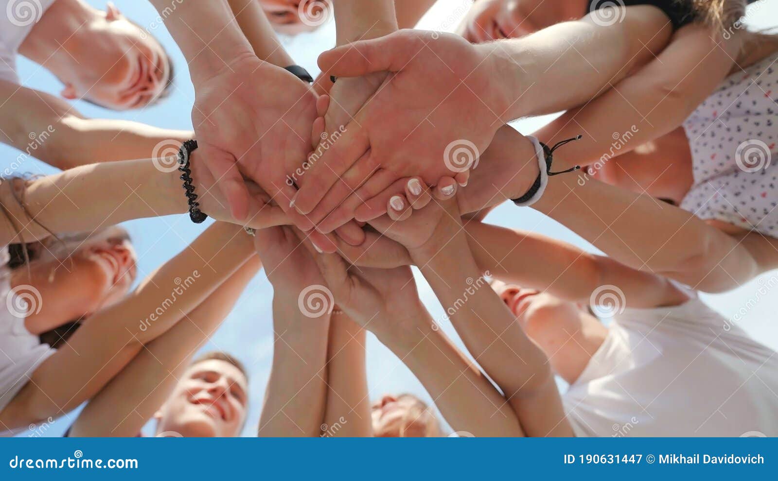 Cheerful Friendly Friends Align Their Hands in the Center. Teamwork ...