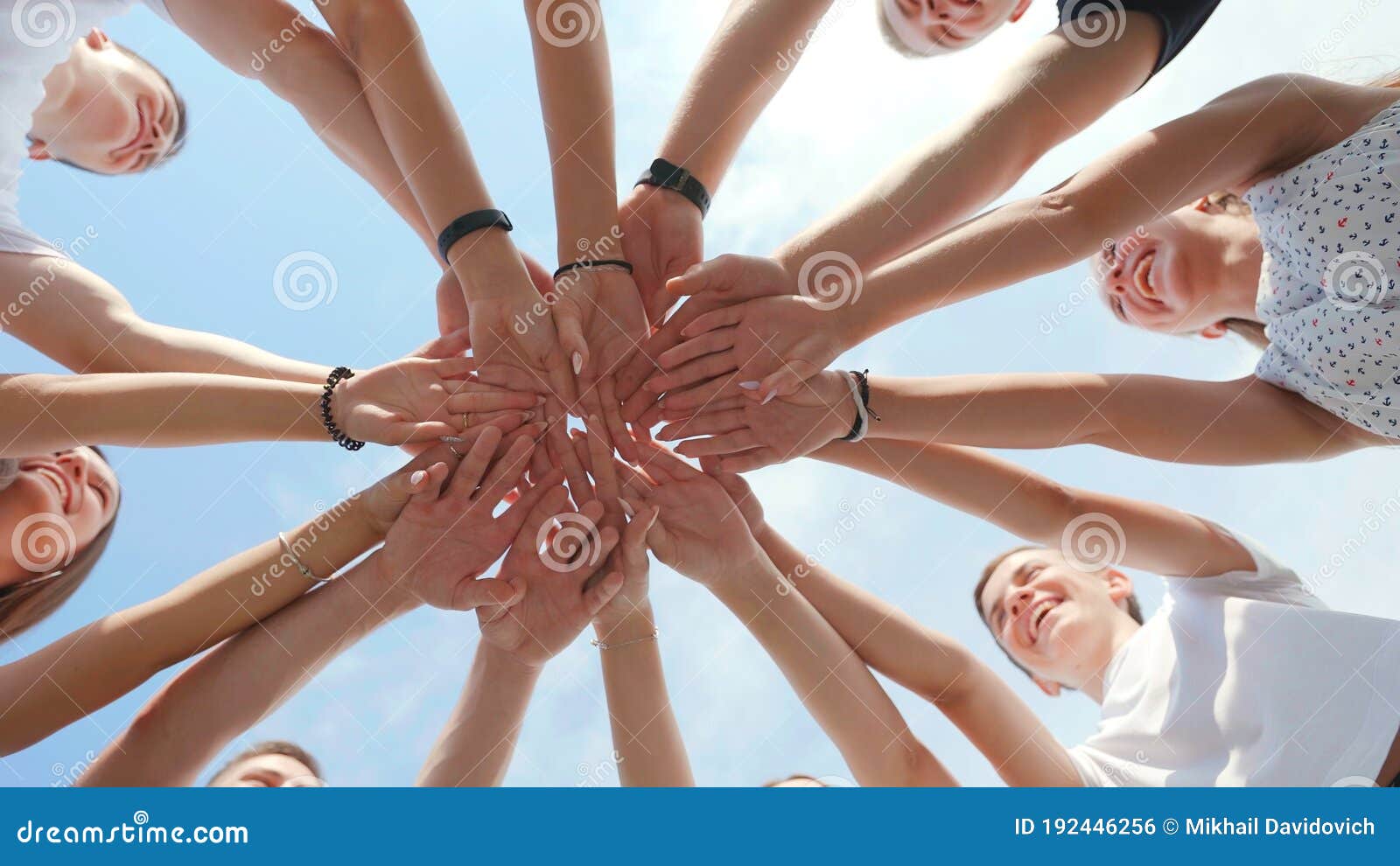 Cheerful Friendly Friends Align Their Hands in the Center. Teamwork ...