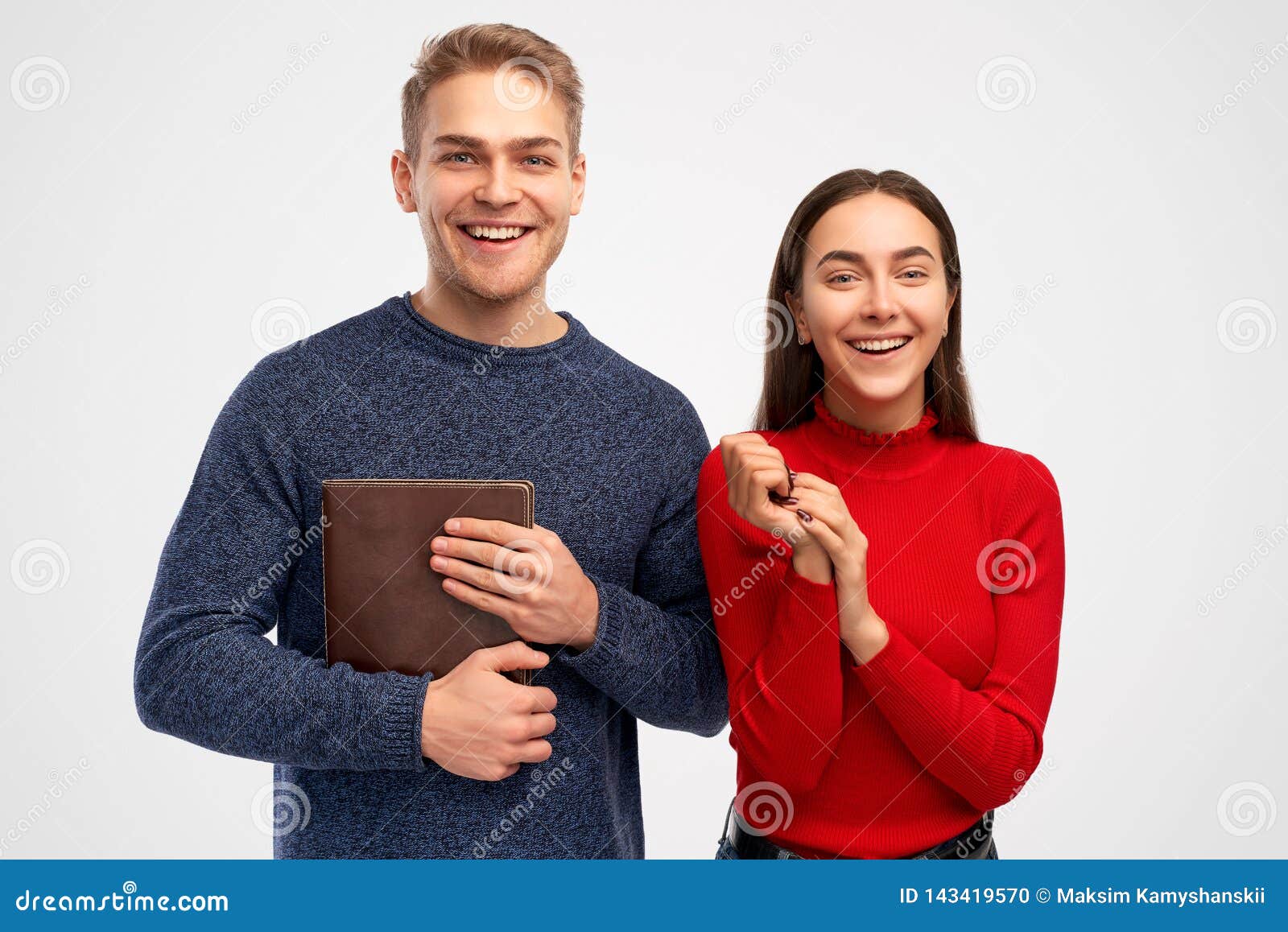 Cheerful Friendly Students, Have Fun Together, Hold Brown Notebook ...