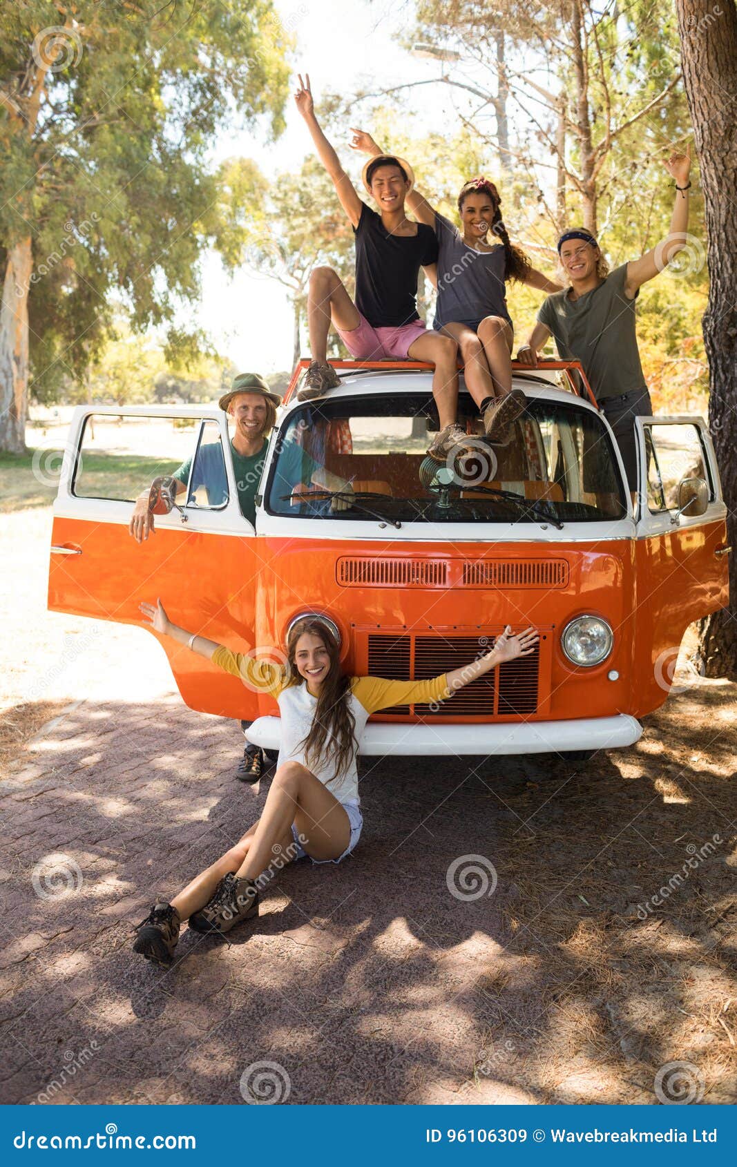 Cheerful Friends with Camper Van on Road Stock Image - Image of ...