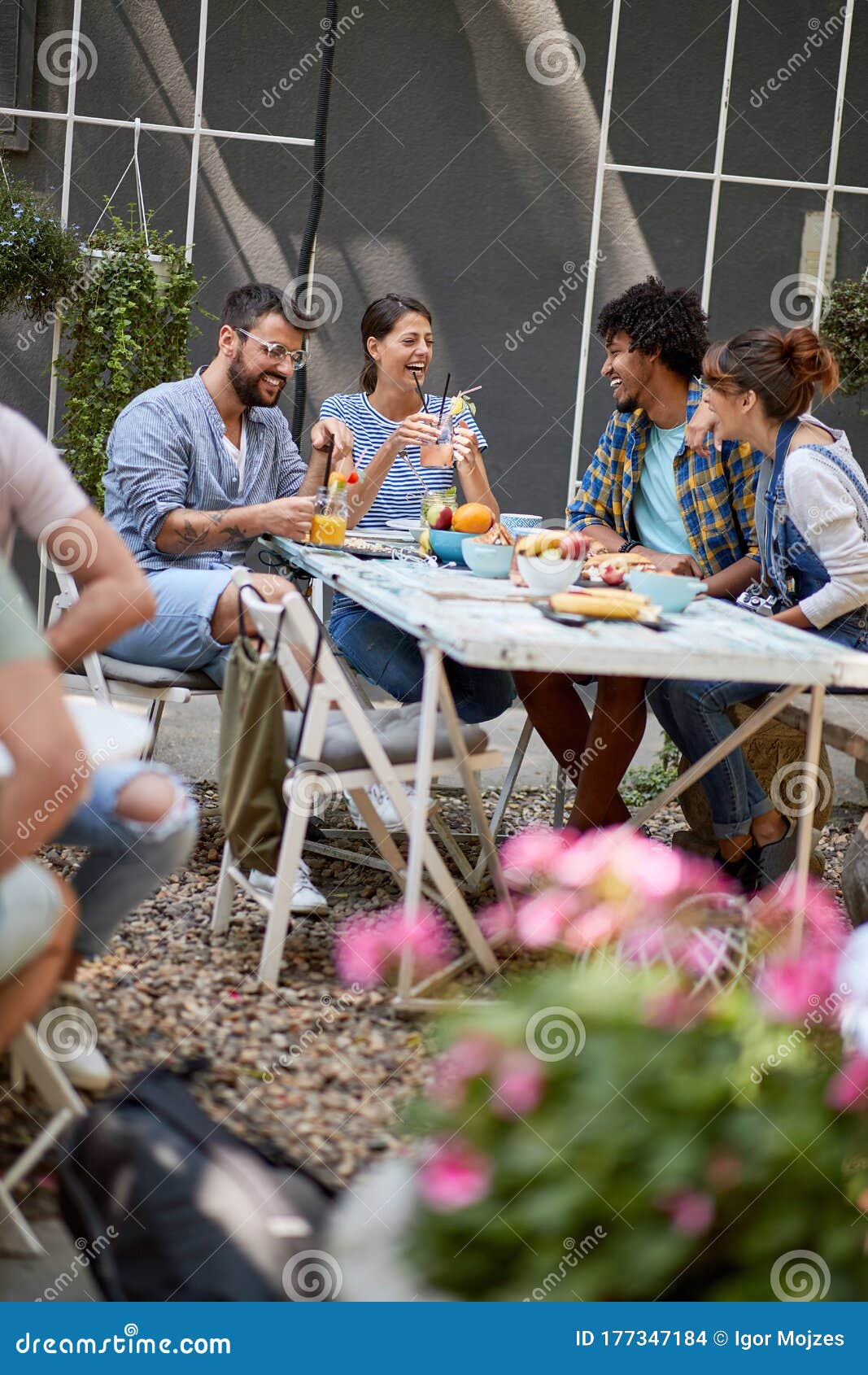 Cheerful Friends Having Fun in Cafe Stock Photo - Image of couple, chat ...