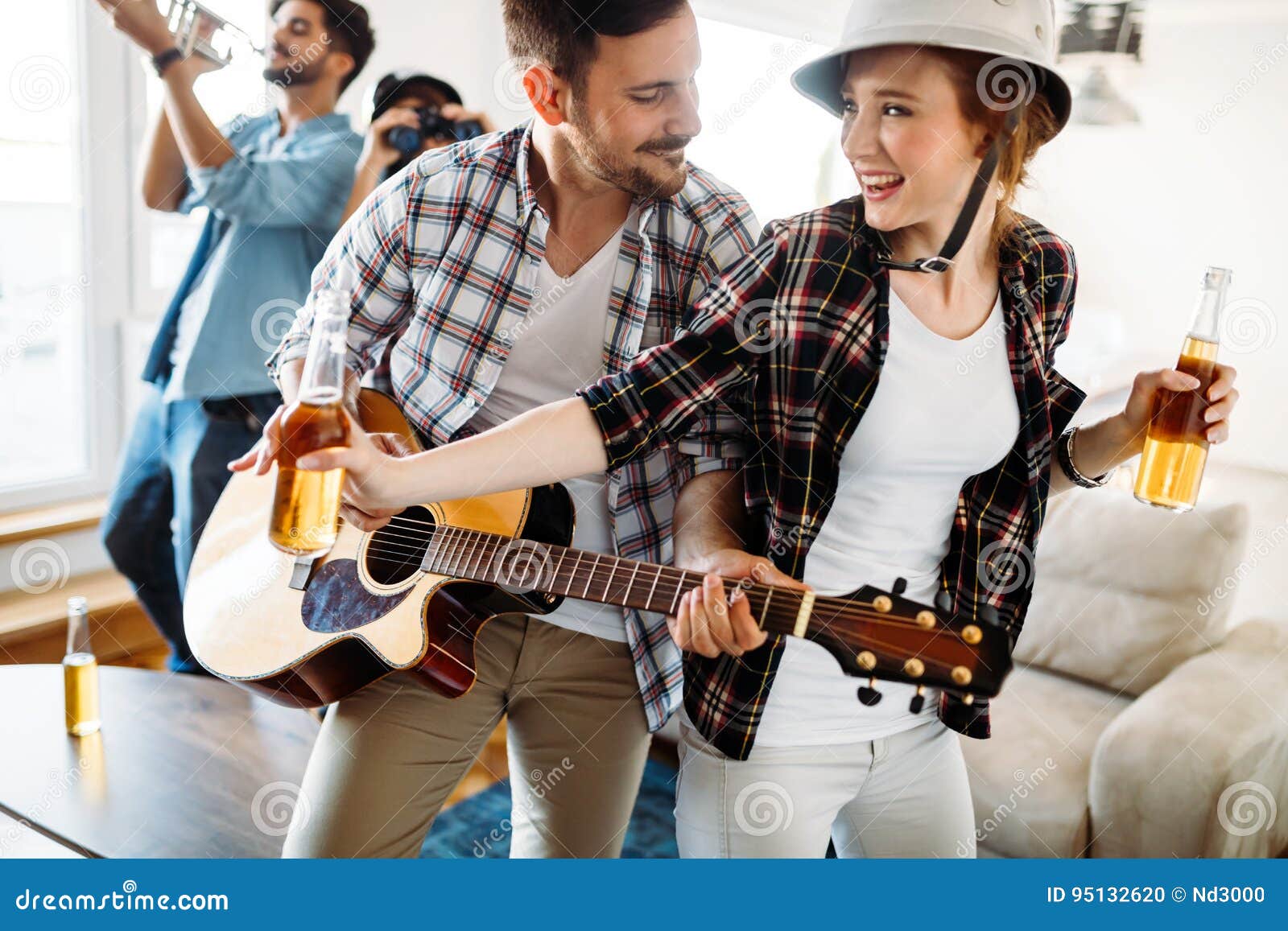 Cheerful Friends Having Party Together and Playing Instruments Stock ...