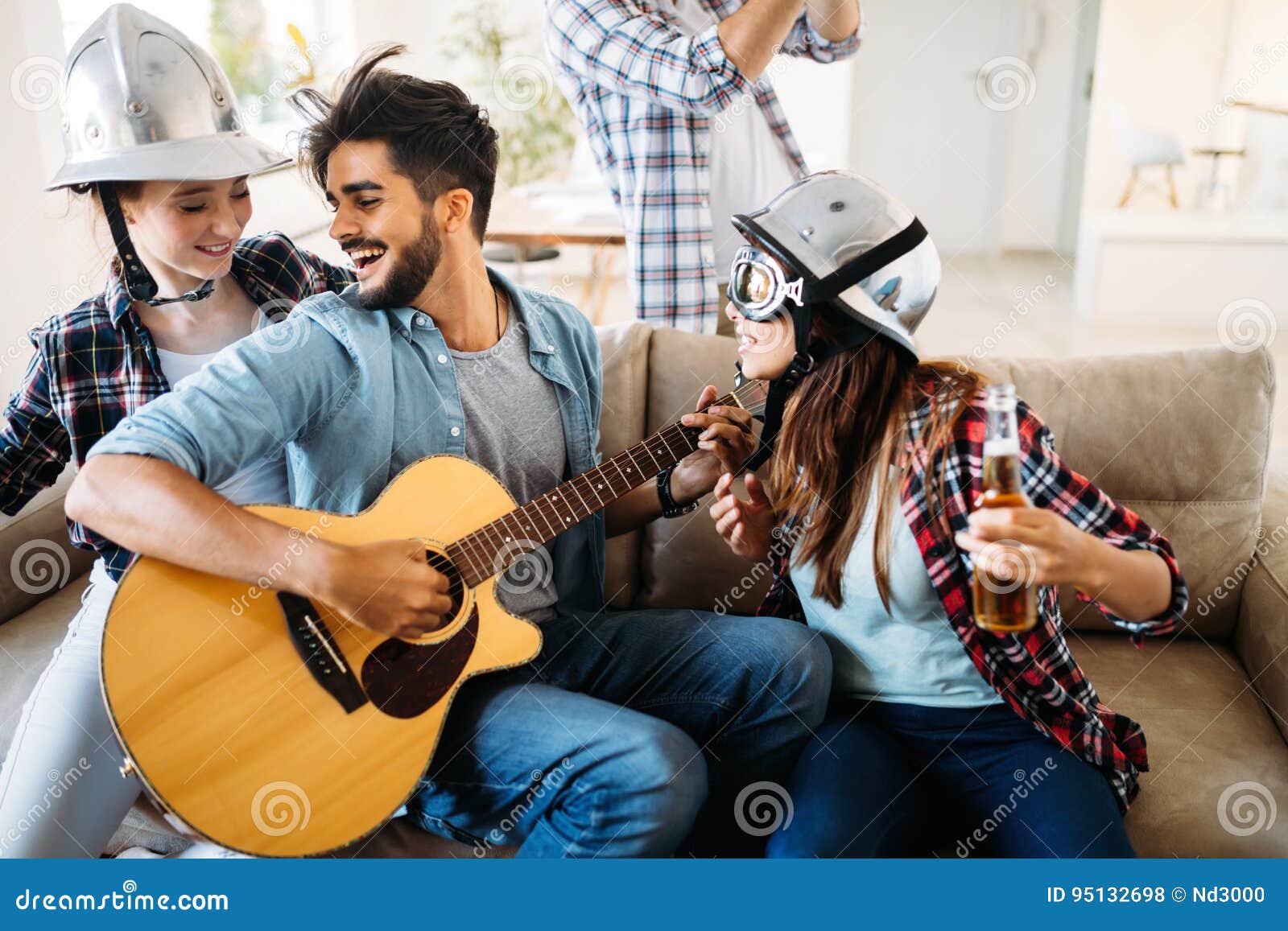 Cheerful Friends Having Party Together and Playing Instruments Stock ...