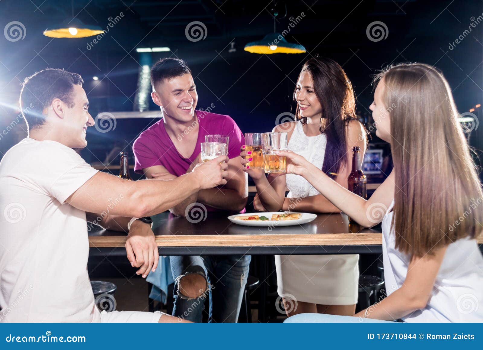 Cheerful Friends in the Pub. Drinking Beer, Talking, Having Fun Stock ...