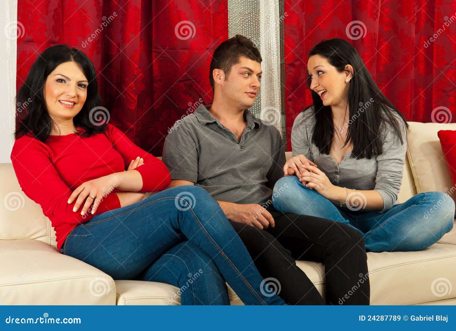 Cheerful friends on sofa stock image. Image of females - 24287789