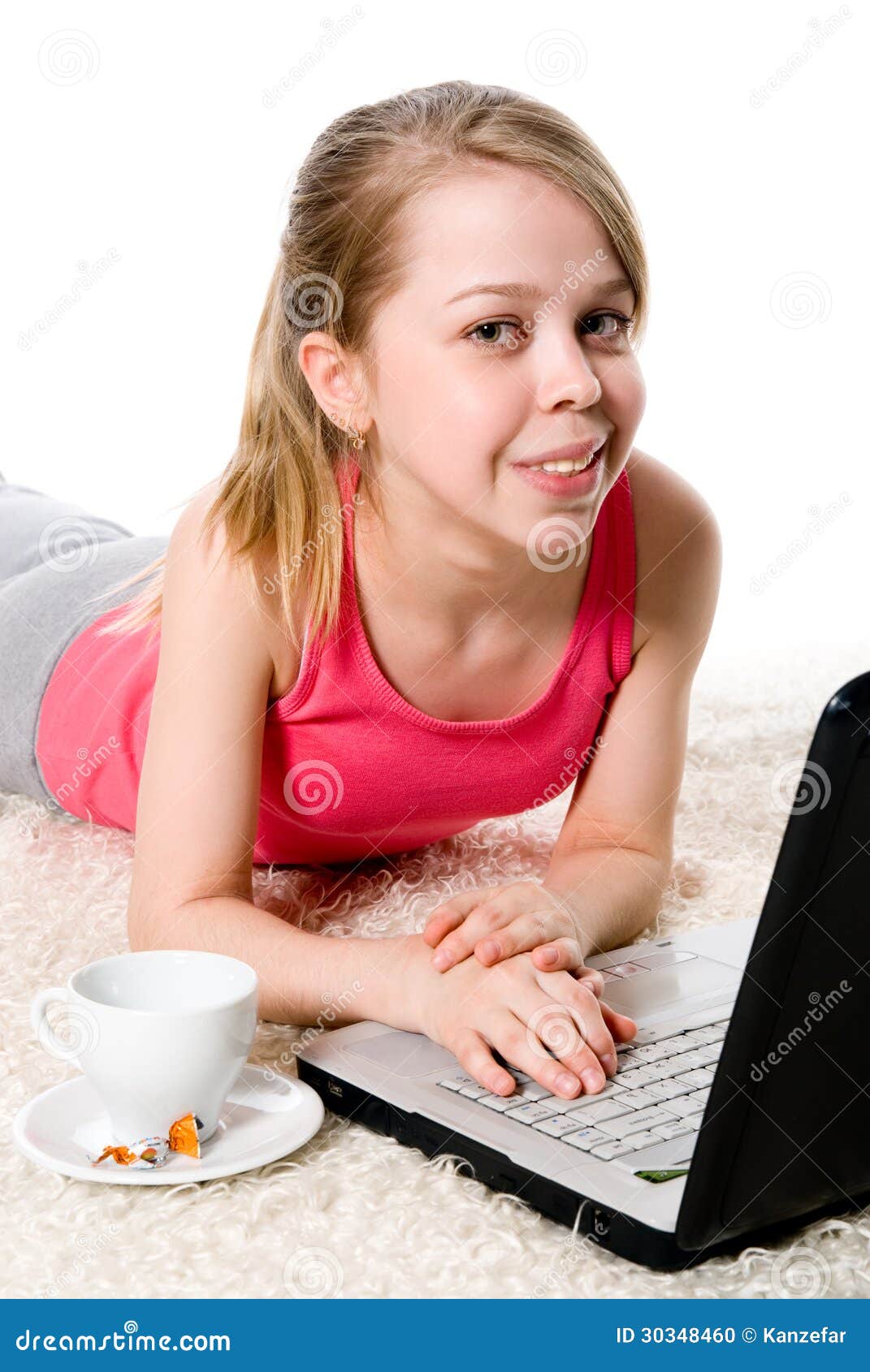 Cheerful Girl Lying on the Floor in Front of Her Laptop Stock Photo - Image of beautiful, browse ...