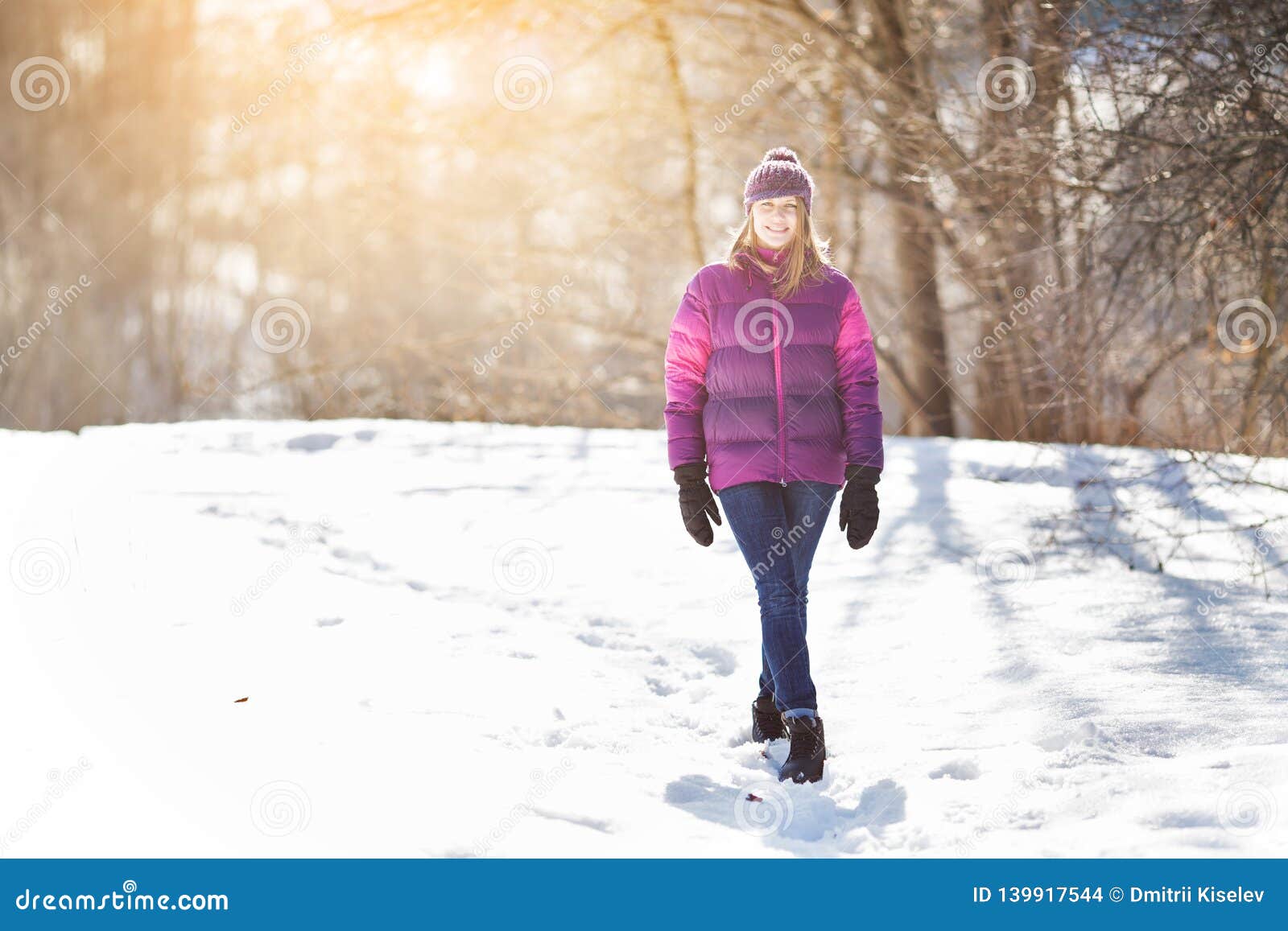 Cheerful Girl Walking in the Snow Stock Photo - Image of coldness ...