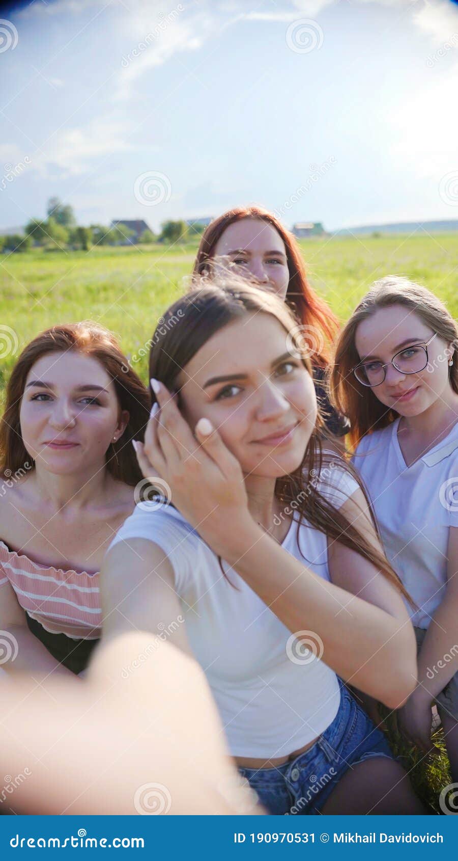 Cheerful Girlfriends Take A Selfie In The Meadow Stock Image Image