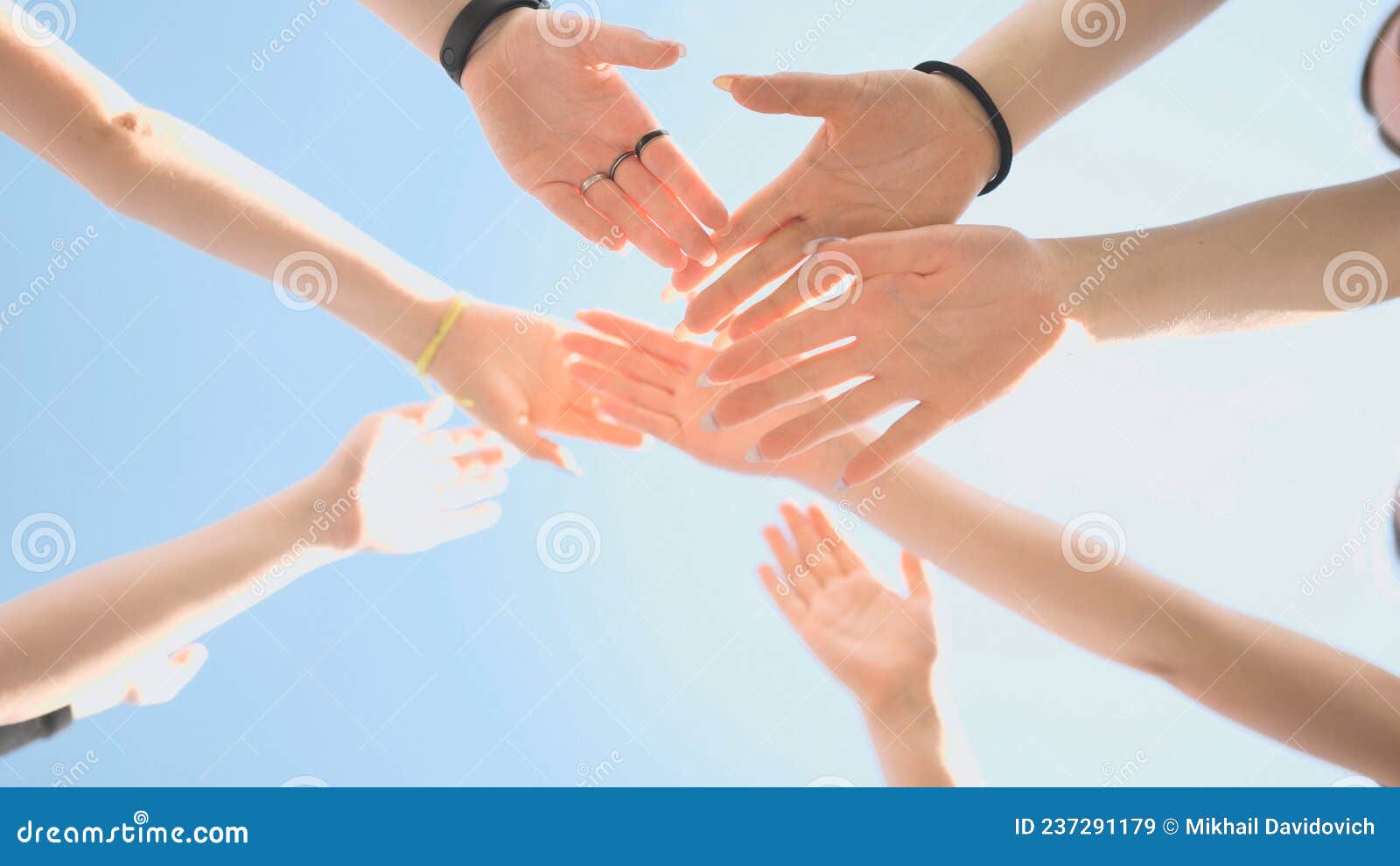Cheerful Girls Join Hands Together As a Sign of Unity and Joint ...
