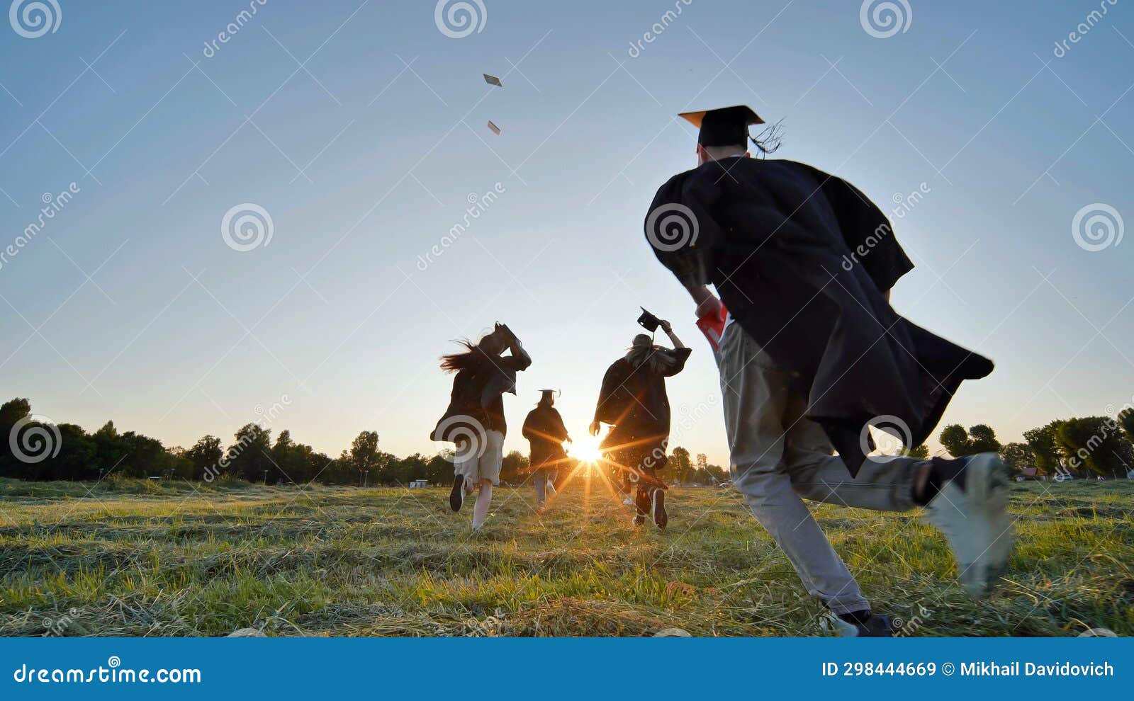 Cheerful Graduates Students Run after School at Sunset. Stock Image ...