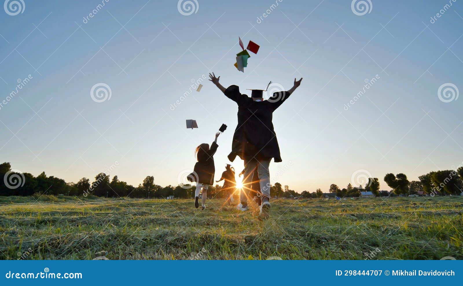 Cheerful Graduates Students Run after School at Sunset. Stock Image ...