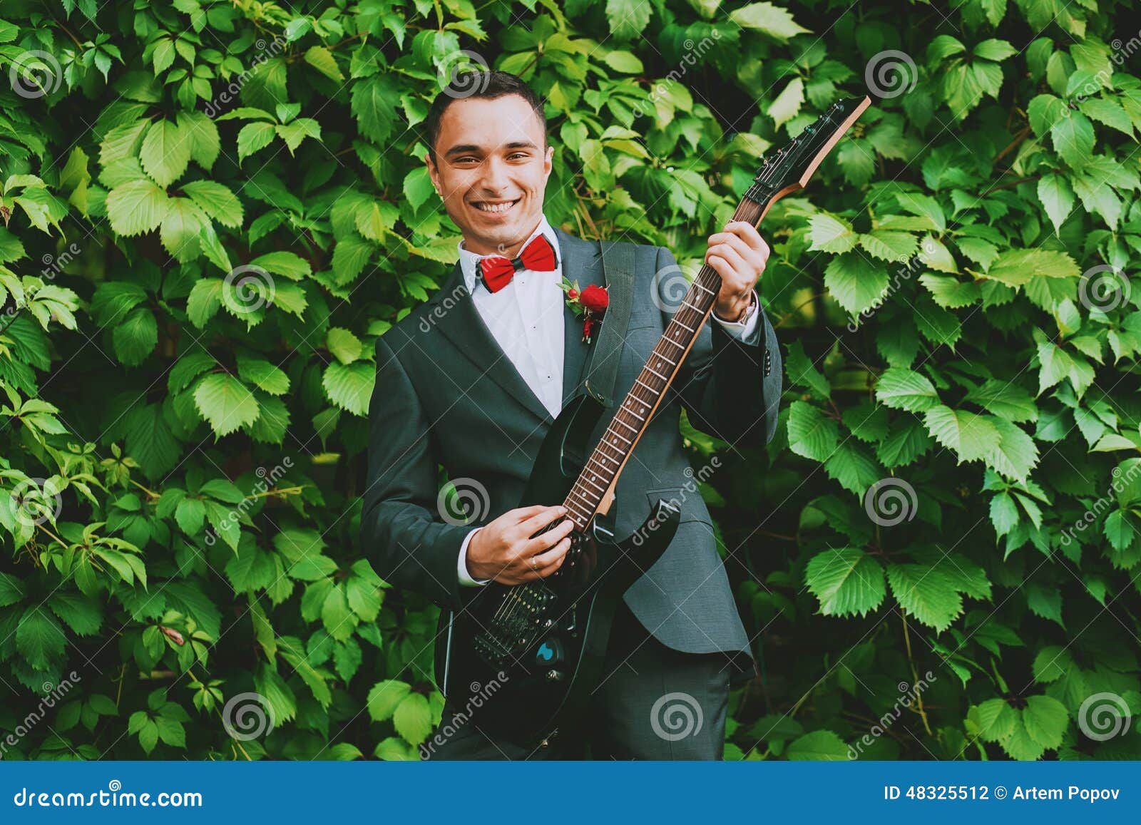 Cheerful Groom Playing the Guitar Stock Photo - Image of instrument ...