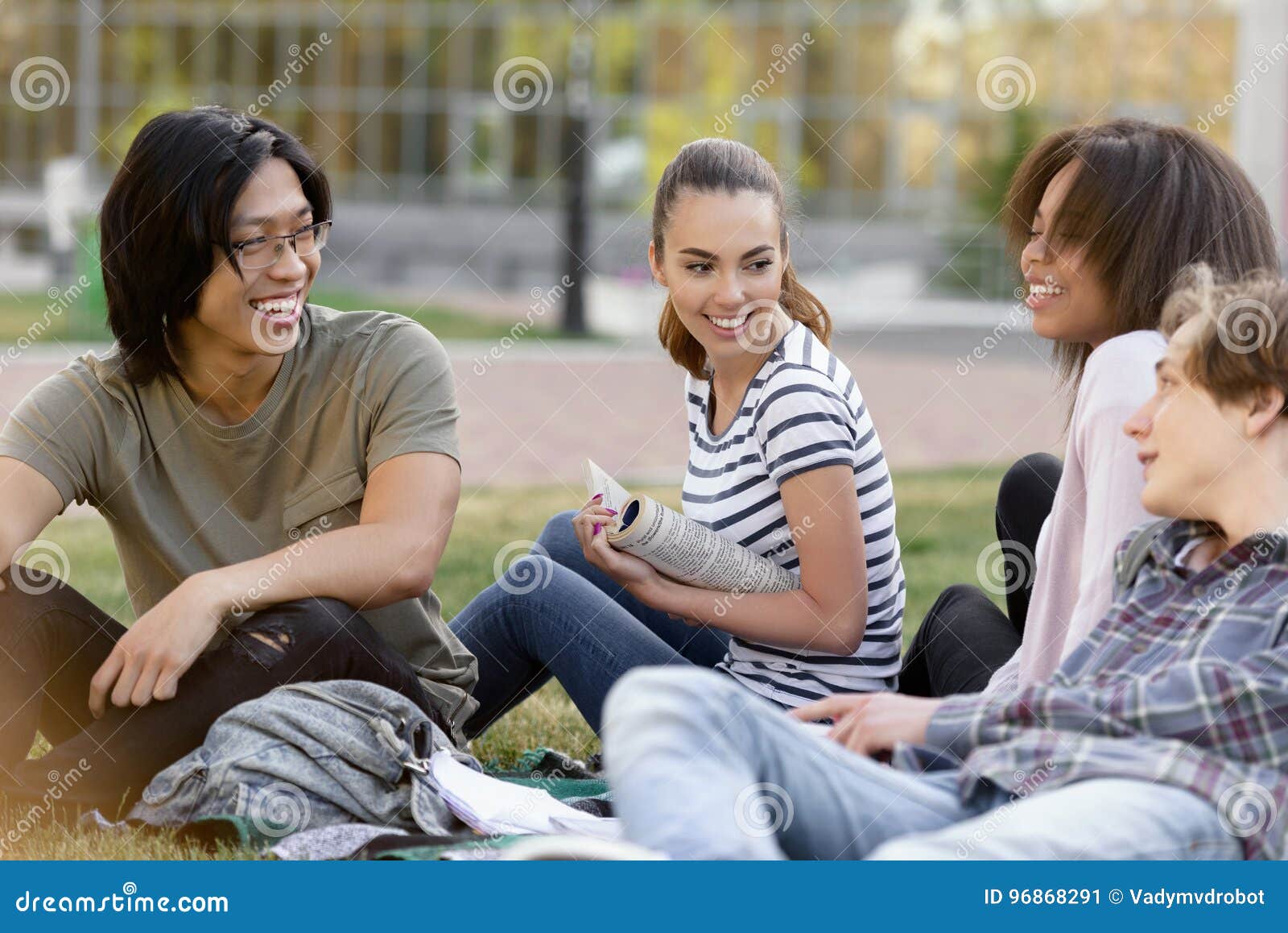 Cheerful Group of Multiethnic Students Studying Outdoors. Stock Image ...