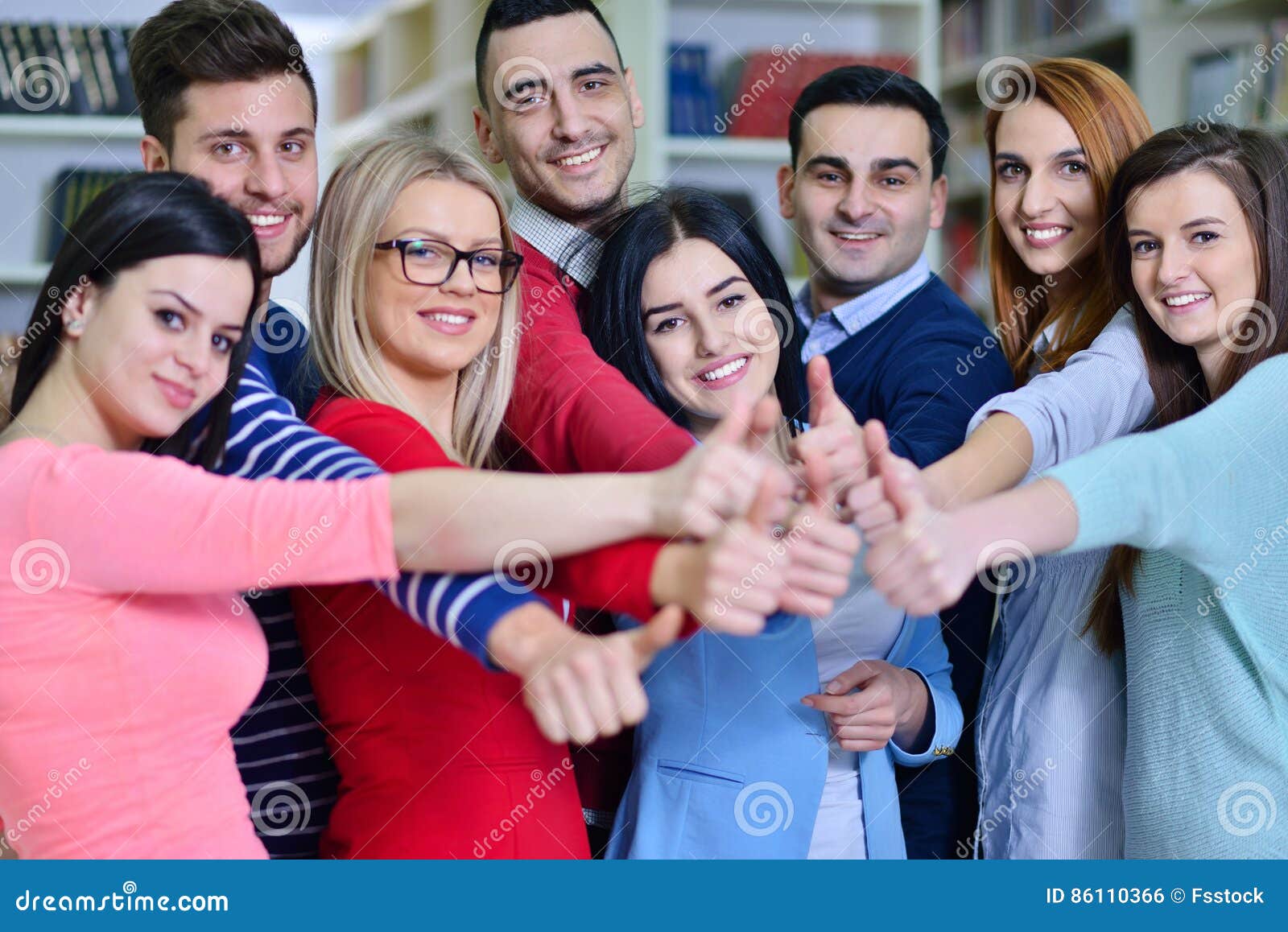 Cheerful Group of Students Smiling at Camera with Thumbs Up, Success ...