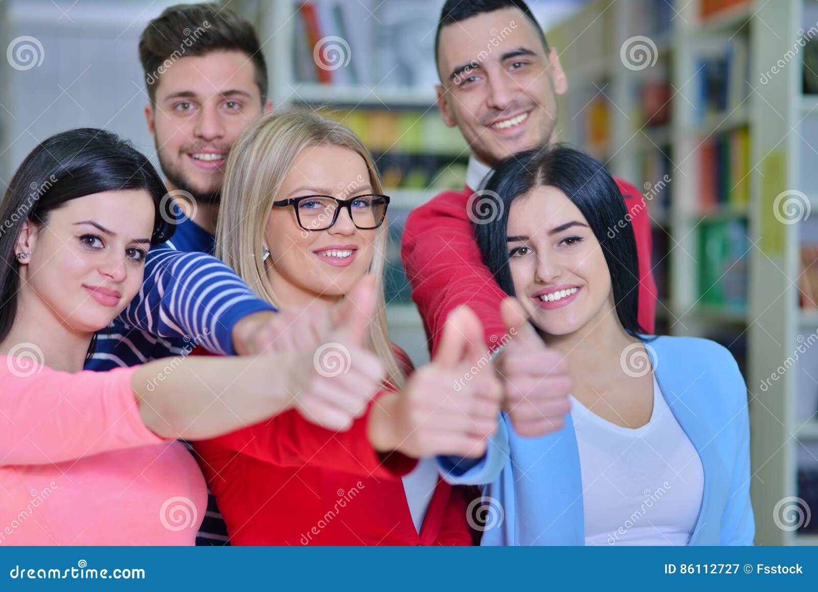 Cheerful Group of Students Smiling at Camera with Thumbs Up, Success ...