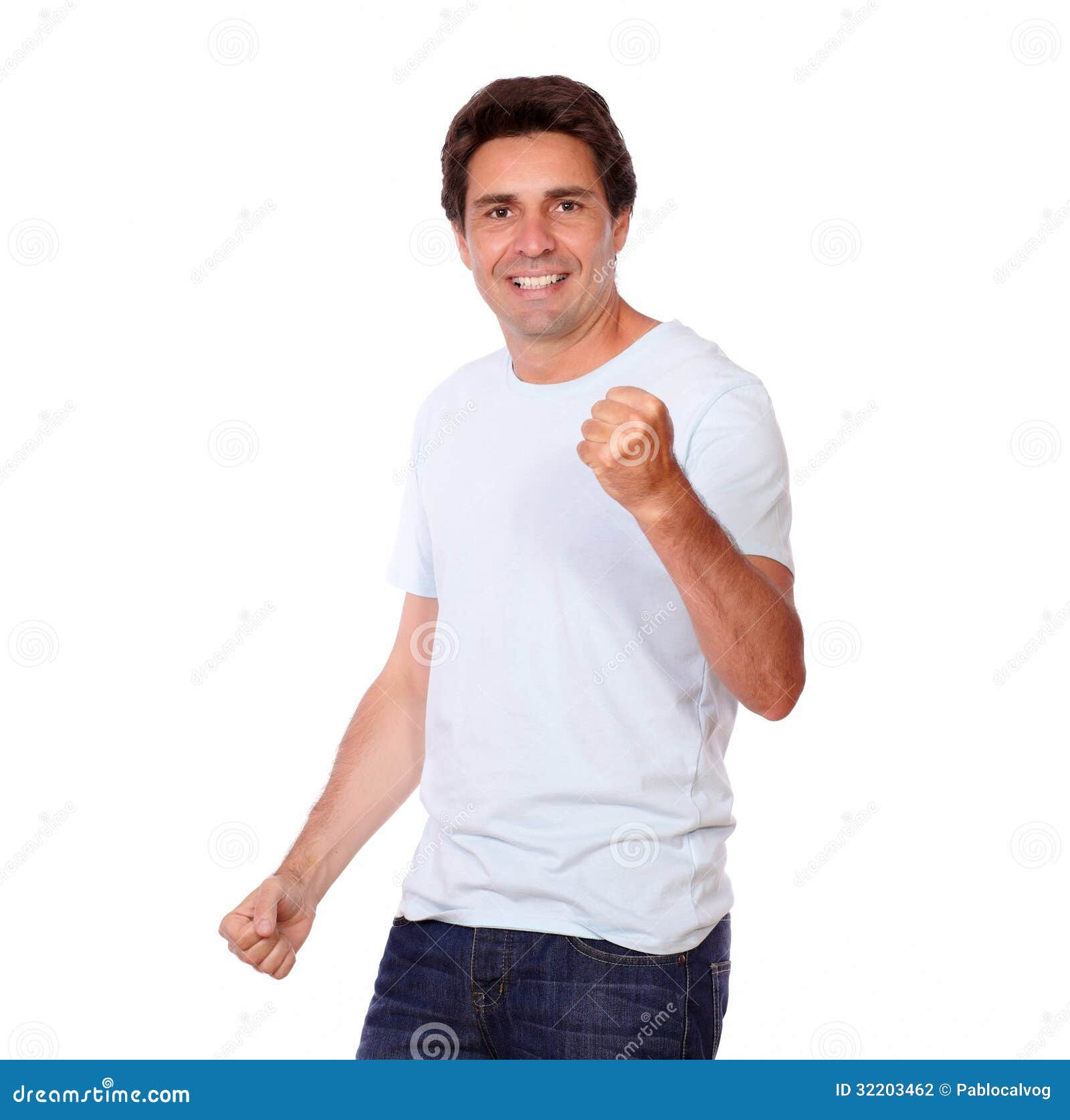 Cheerful Guy Celebrating Victory while Standing Stock Photo - Image of ...