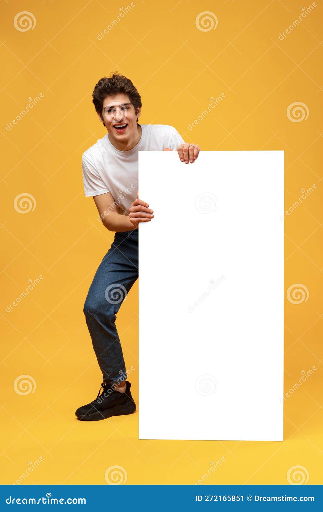Cheerful Guy Demonstrate Empty Space Blank Offer on Yellow Background ...