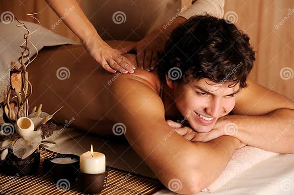 Cheerful Guy Getting Massage and Relaxation Stock Photo - Image of ...