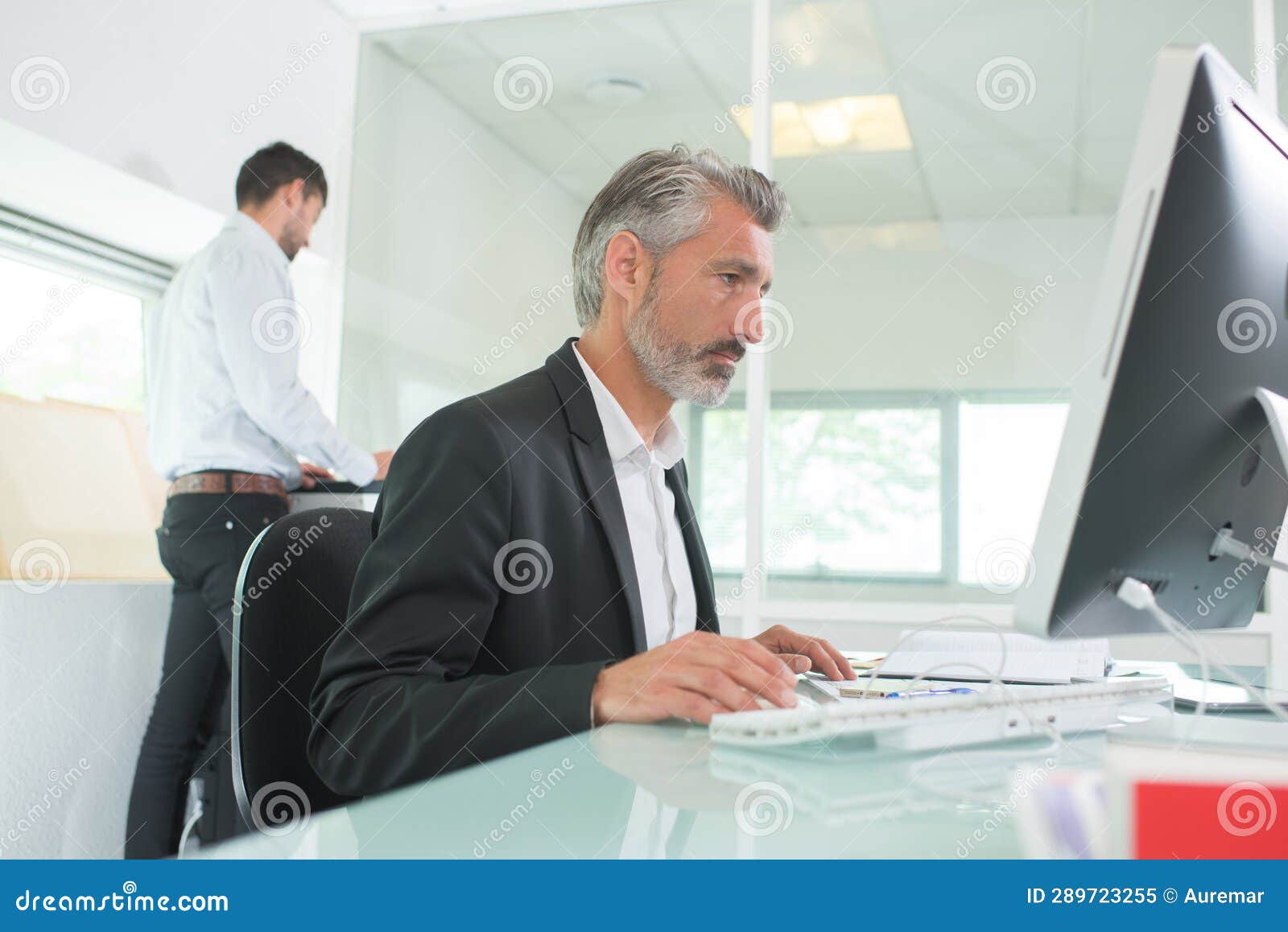 Cheerful Guy Sitting in Front Desktop Computer Stock Image - Image of ...