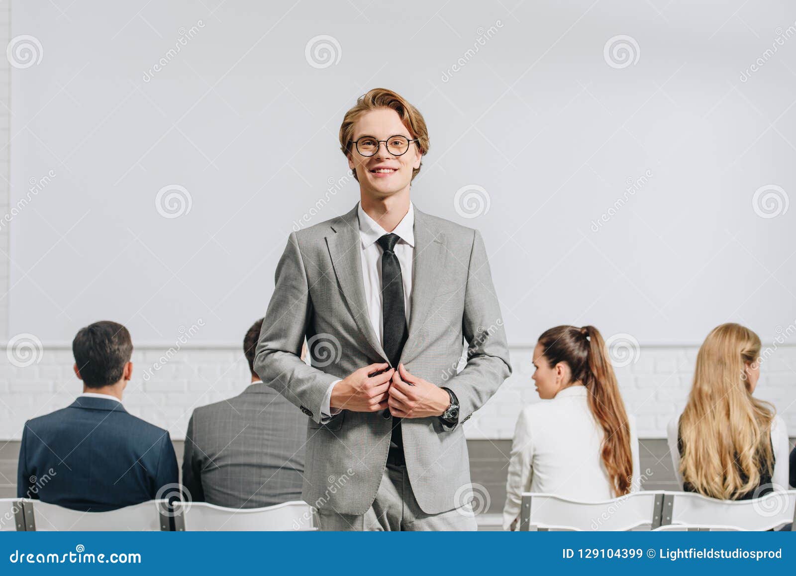Cheerful Handsome Coach Looking at Camera during Business Training ...