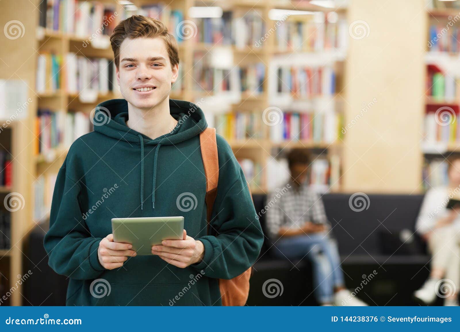 Cheerful High School Student with Tablet Stock Photo - Image of library ...