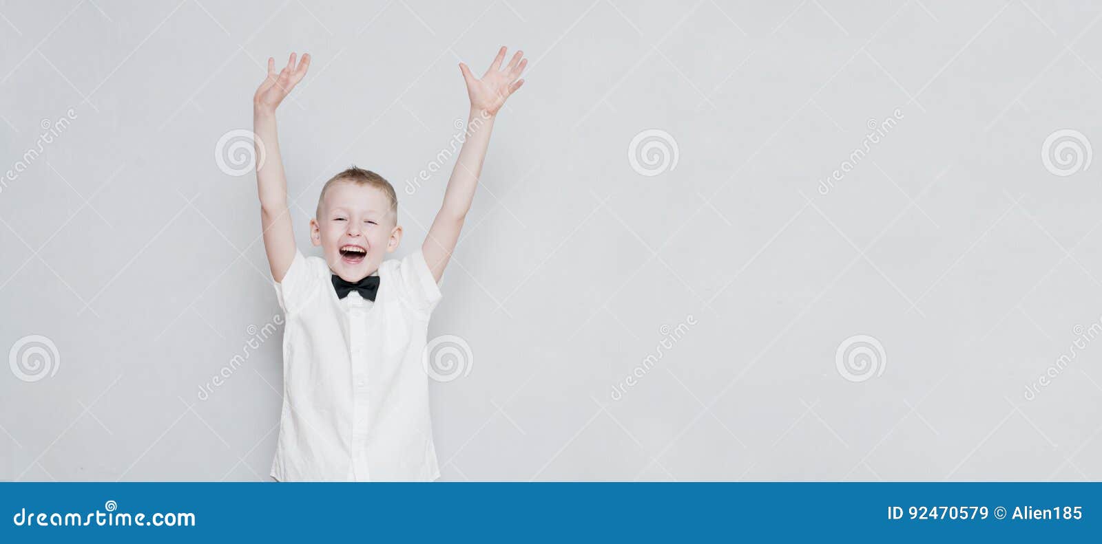 Cheerful kid with hands up stock image. Image of birthday - 92470579