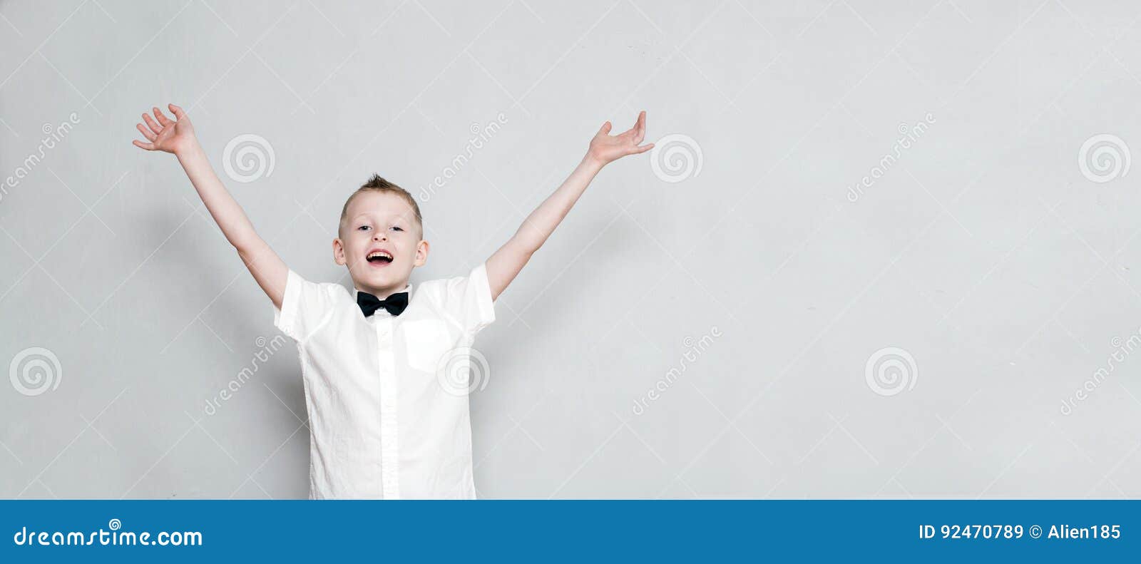 Cheerful kid with hands up stock image. Image of lifestyles - 92470789
