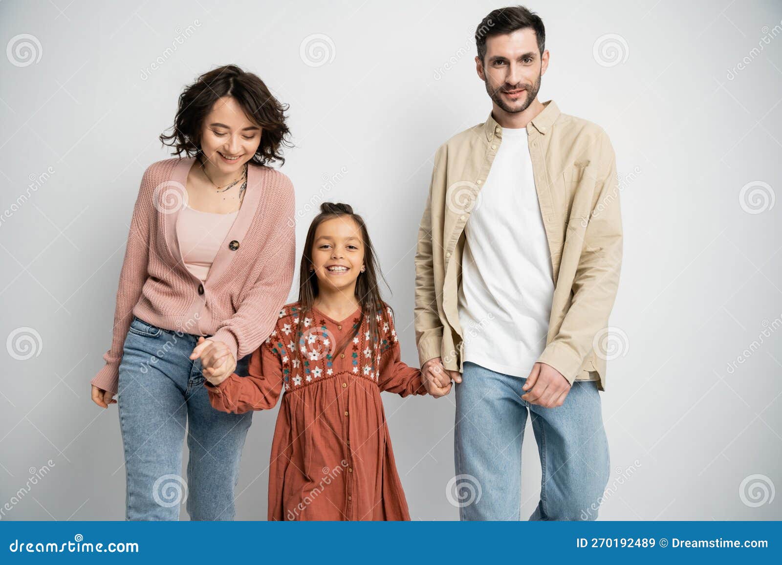 Cheerful Kid Holding Hands of Parents Stock Image - Image of hold ...