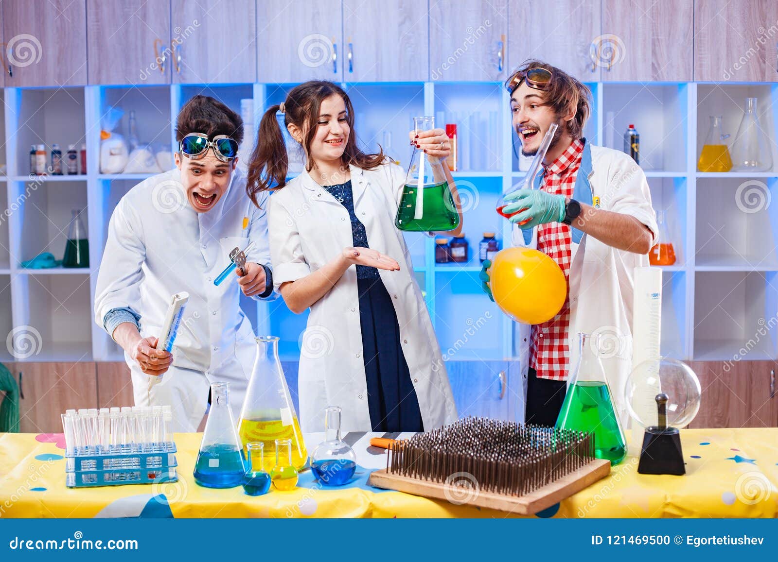 Cheerful Lab Assistants Making Experiments Stock Photo - Image of ...