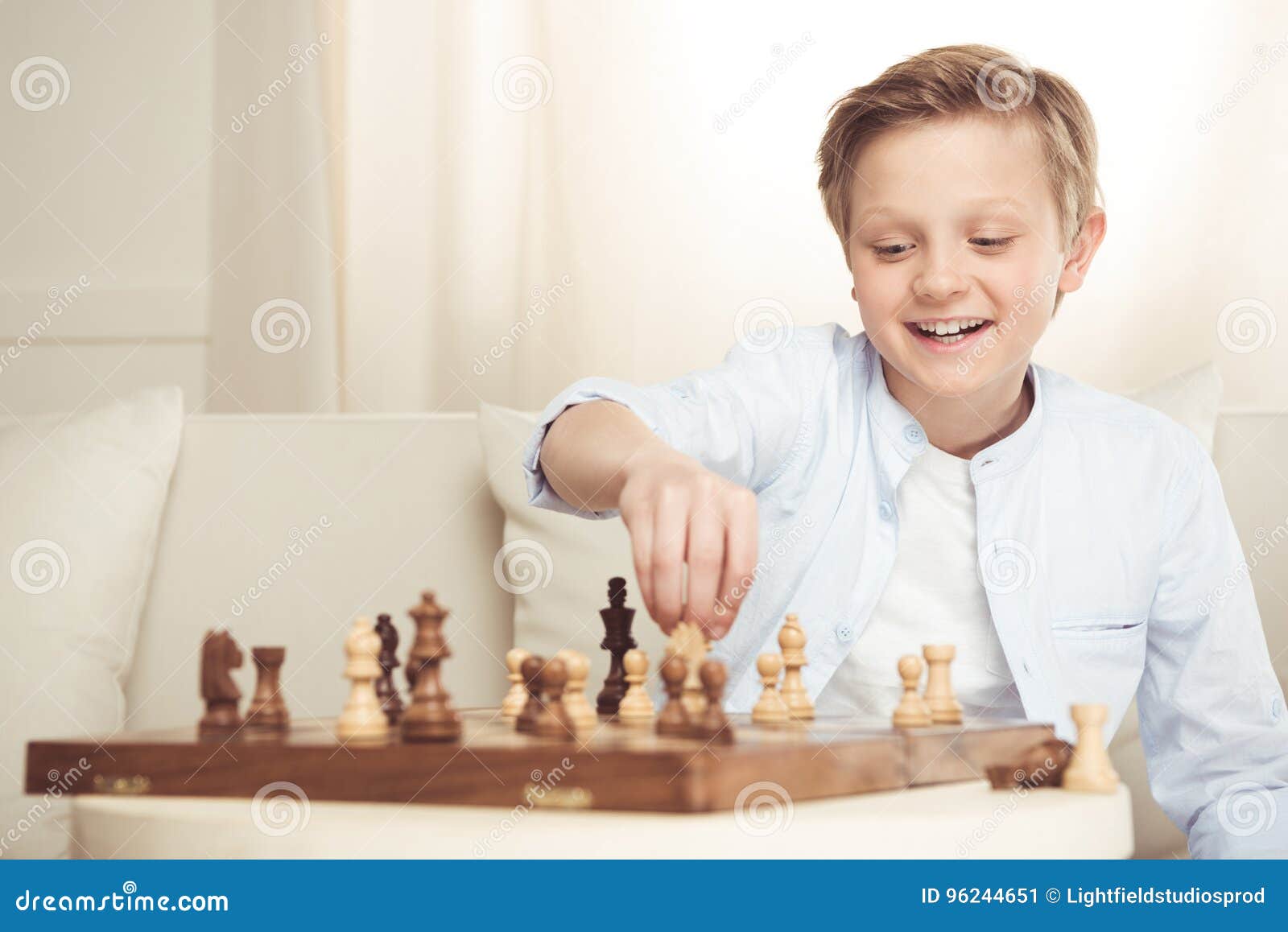 Cheerful Little Boy Playing Chess Alone at Home Stock Image - Image of ...