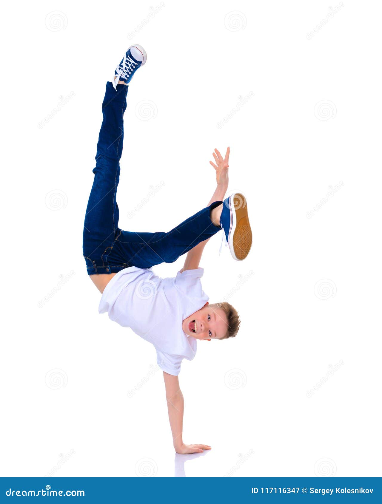 A Cheerful Little Boy from School Age is Dancing Breakdance. Stock ... A Cheerful Little Boy from School Age is Dancing Breakdance. Stock ...