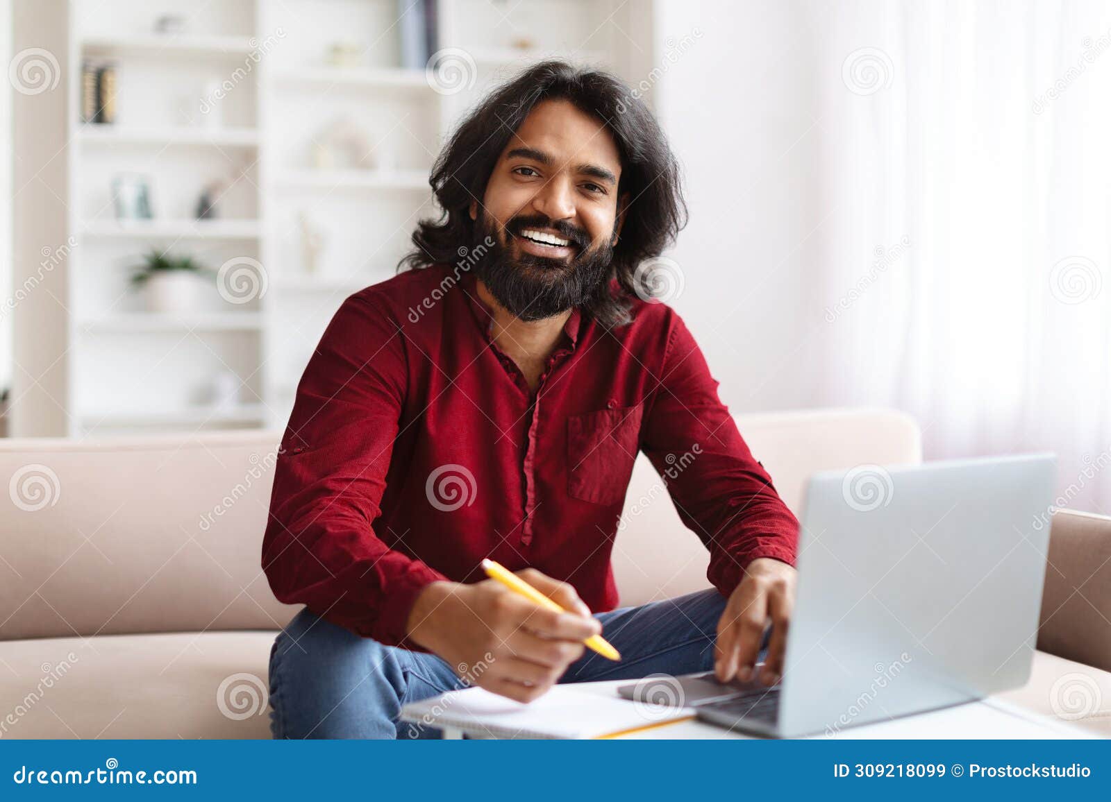 Cheerful Eastern Man Have Online Training, Using Laptop at Home Stock ...