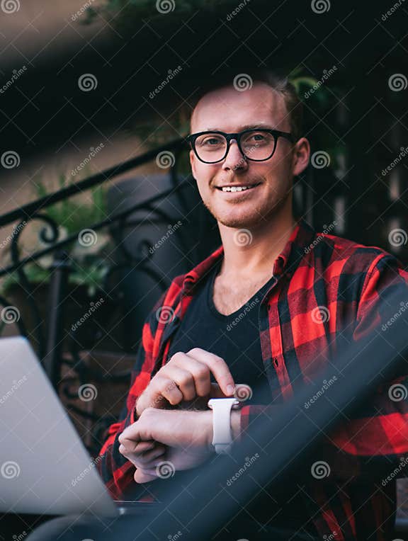 Cheerful Man Checking Time during Remote Work Stock Photo - Image of ...
