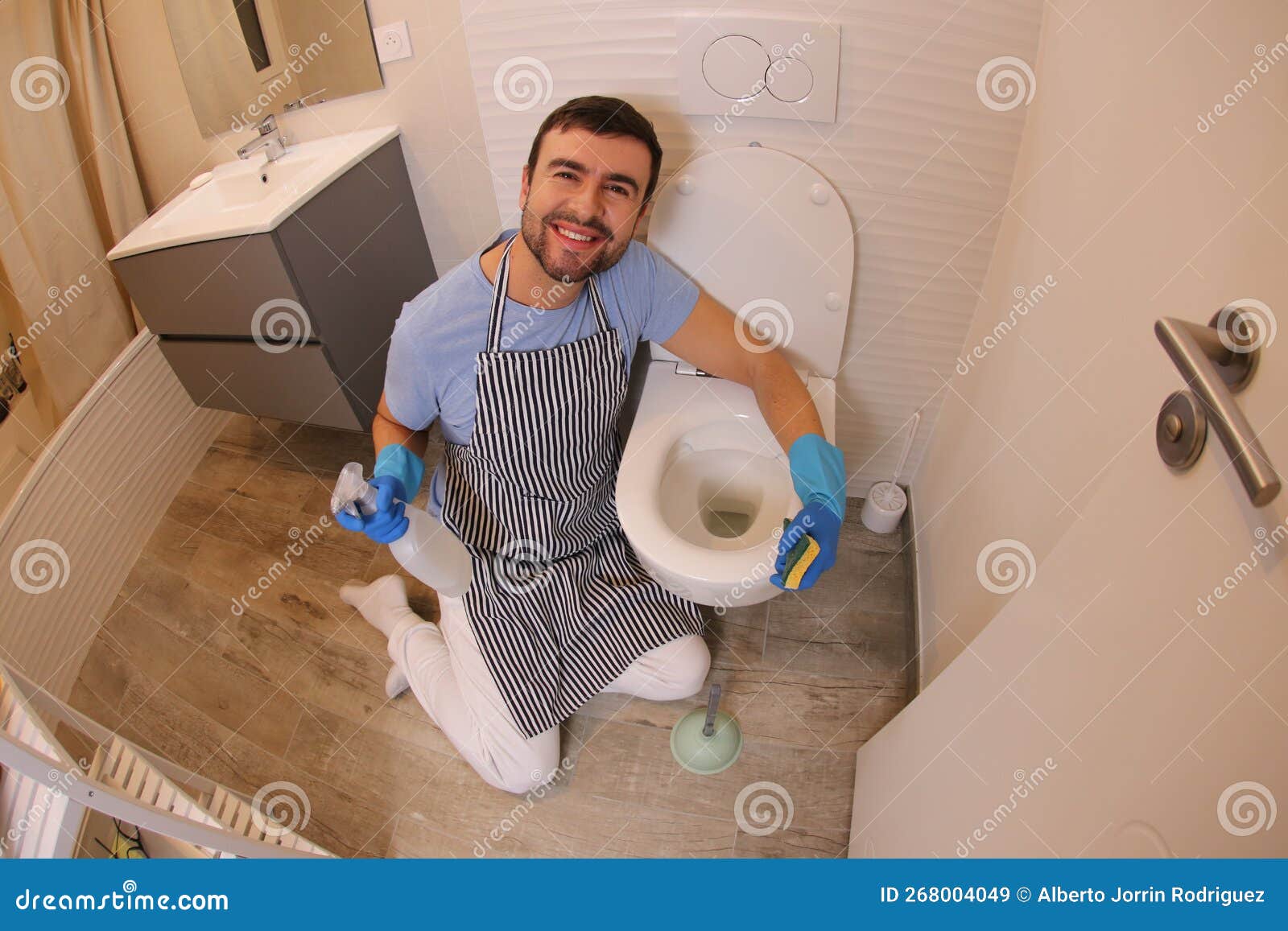 Cheerful Man Cleaning the Toilet Stock Image - Image of home, cleaner ...