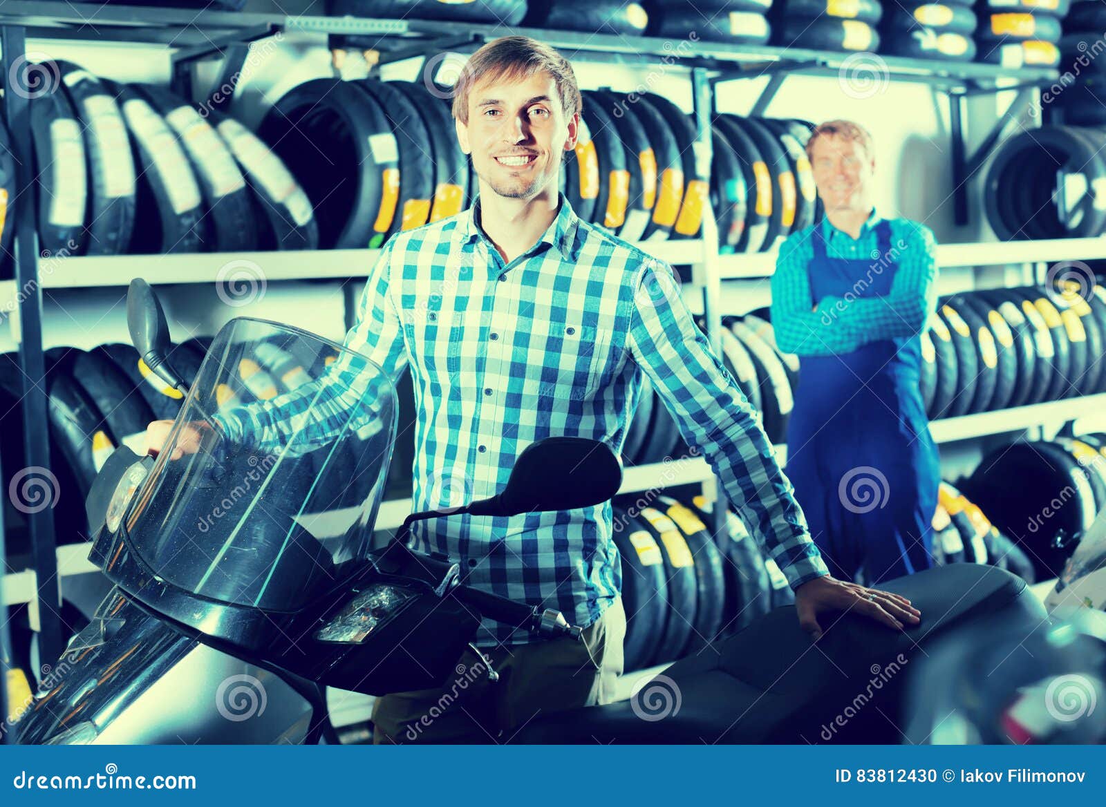 Cheerful Man Customer Holding His Motorcycle Stock Photo - Image of ...