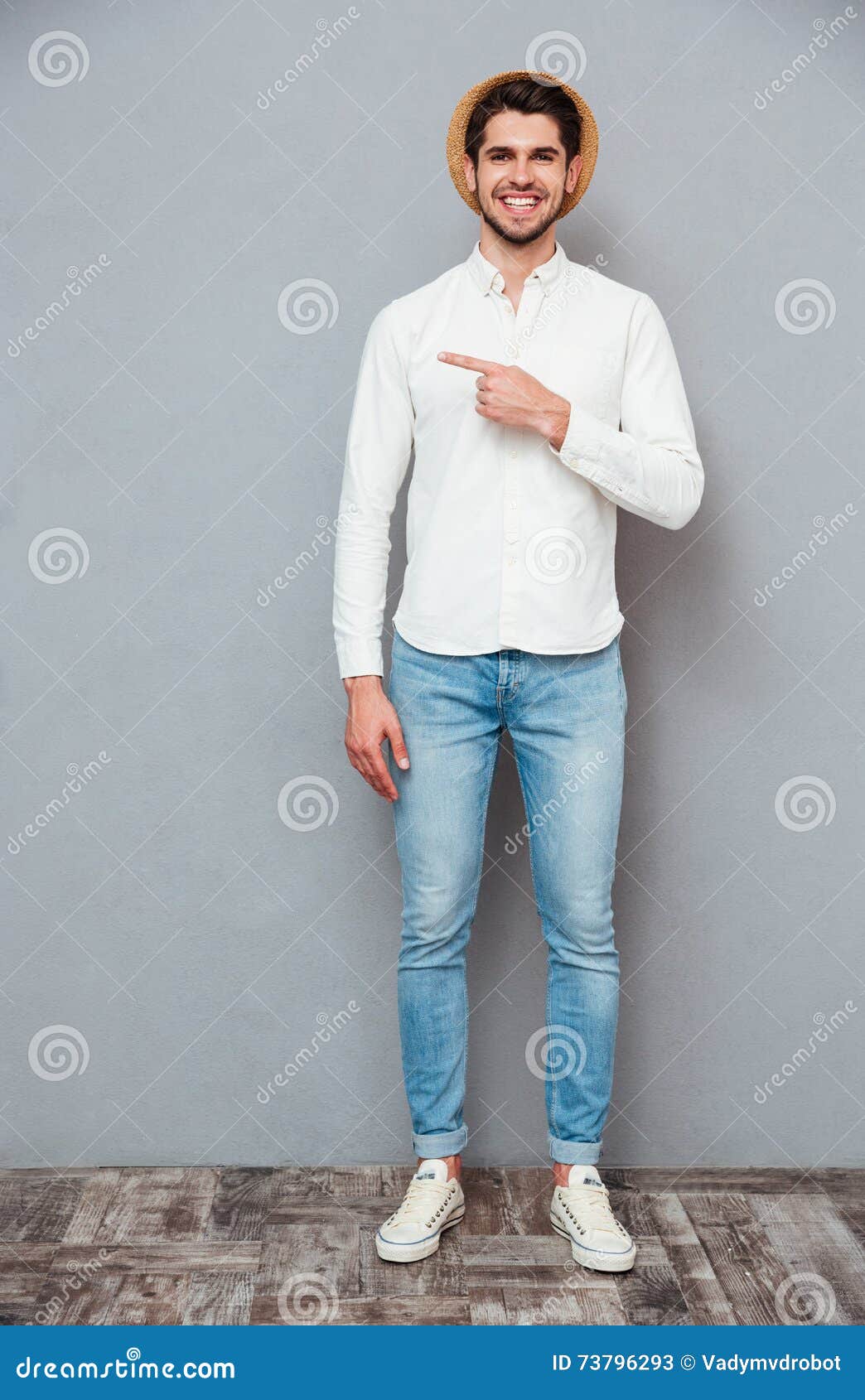 Cheerful Man in Hat Standing and Pointing To the Side Stock Image ...