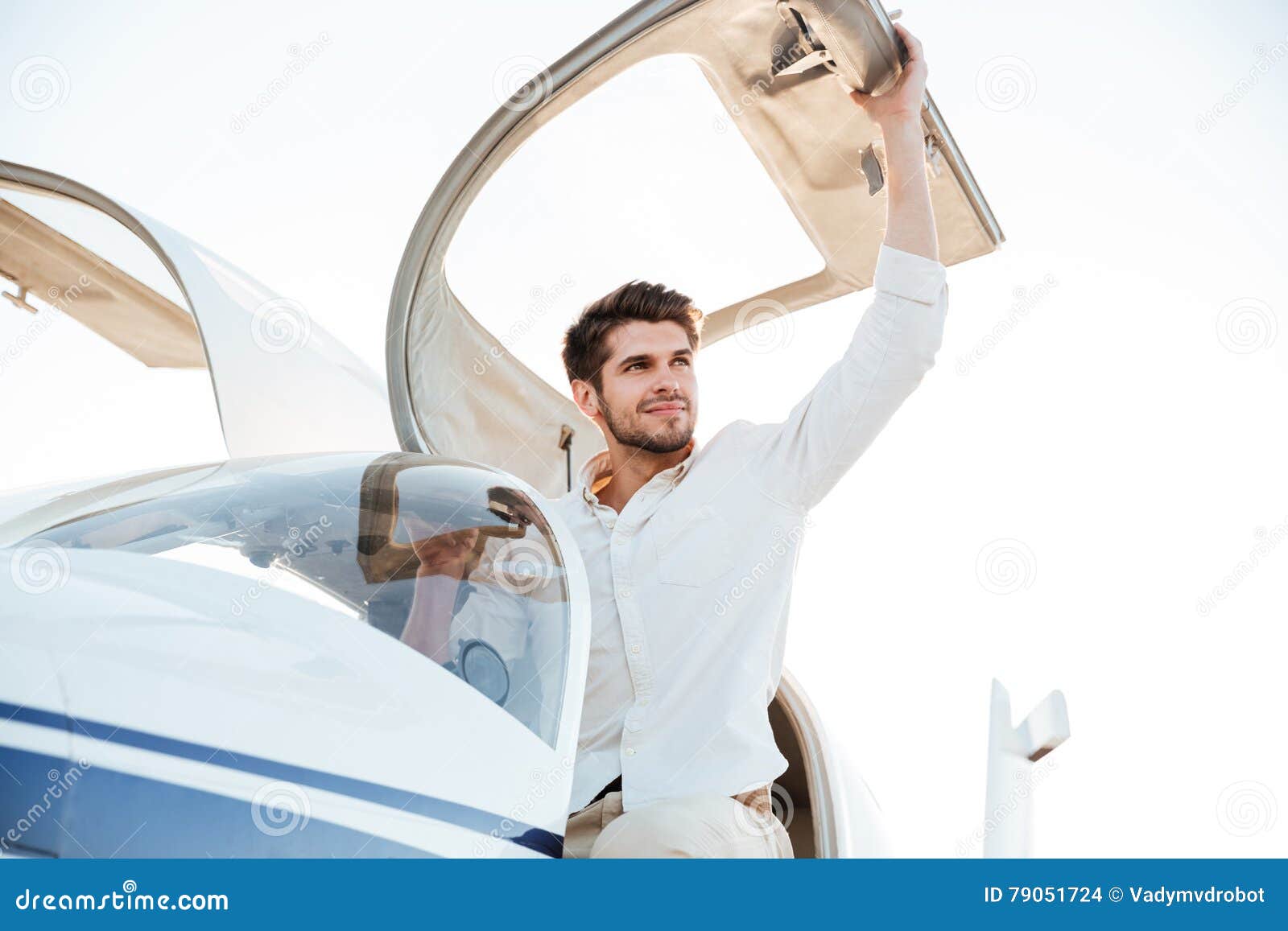 Cheerful Man Pilot Getting Out of the Plane after Landing Stock Photo ...