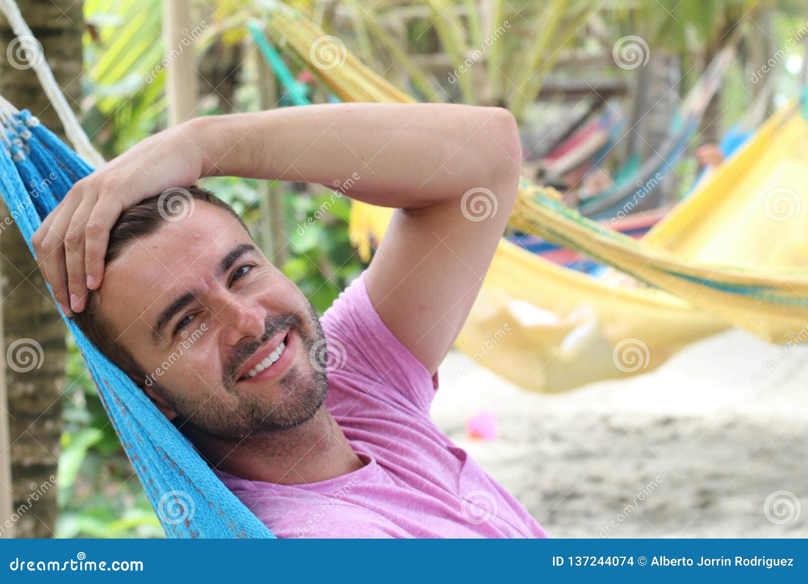 Cheerful Man Resting in a Hammock Stock Photo - Image of people, palm ...