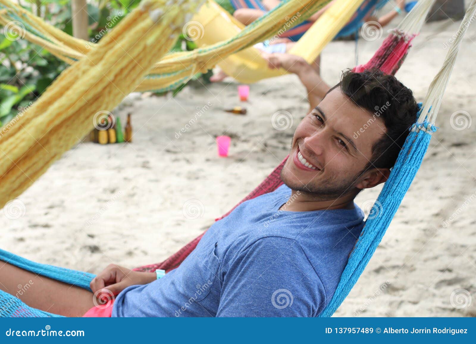 Cheerful Man Resting in a Hammock Stock Image - Image of camp, hispanic ...
