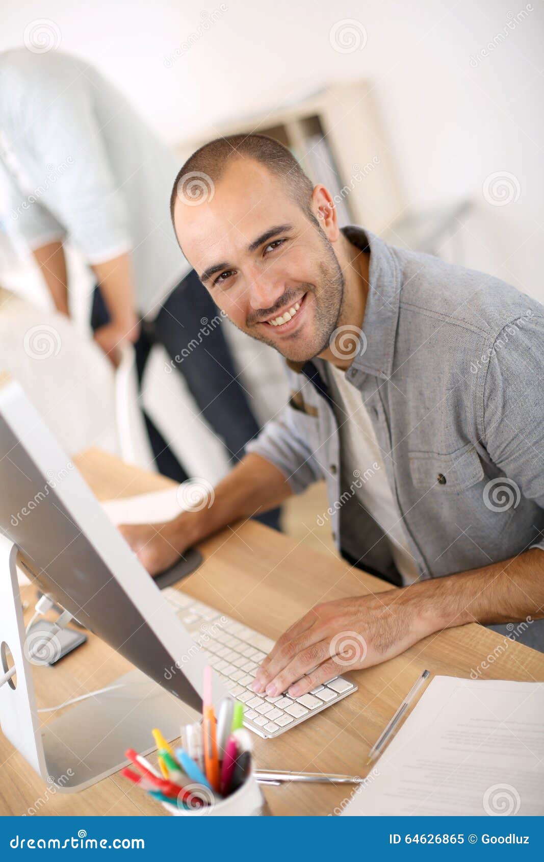 Cheerful Man Working on Computer at Office Stock Image - Image of team ...