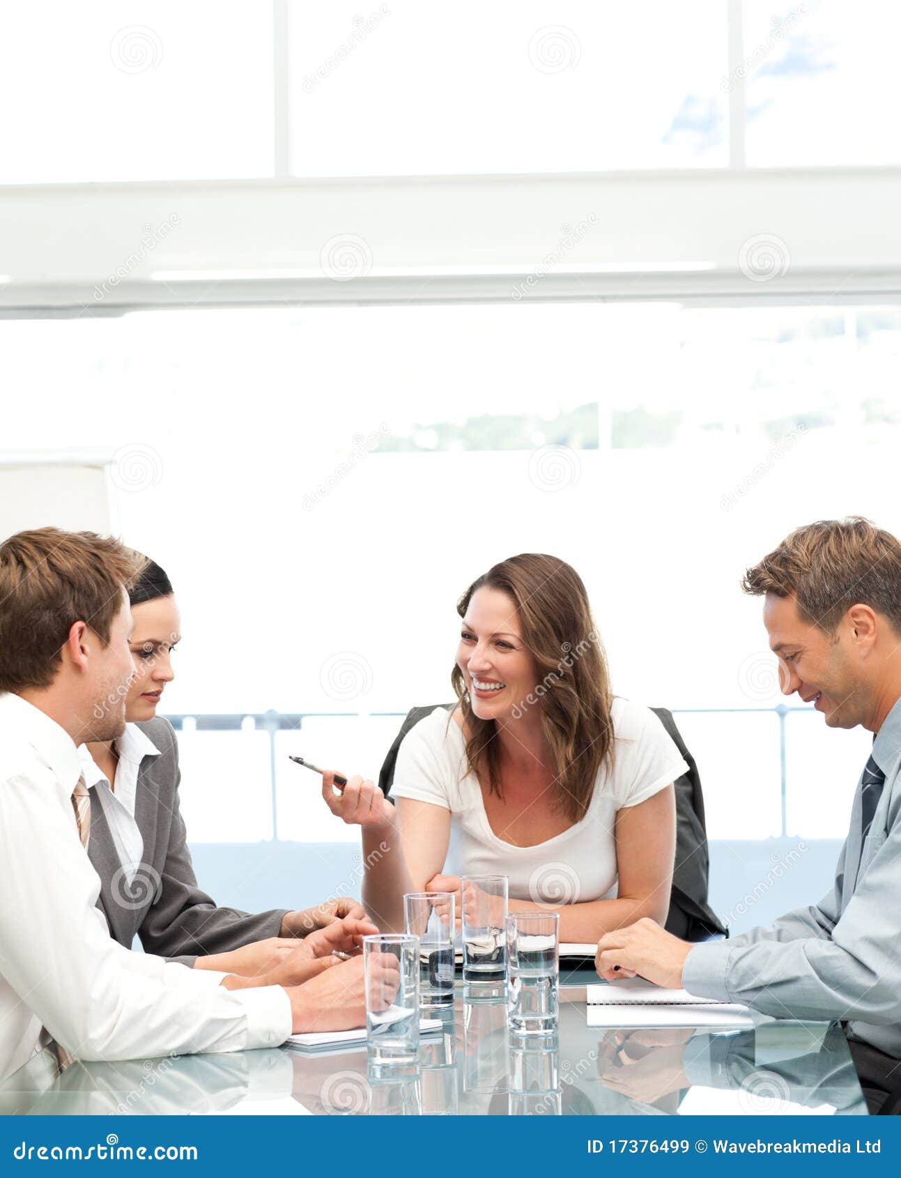 Cheerful Manager Talking To Her Team Stock Image - Image of handsome ...