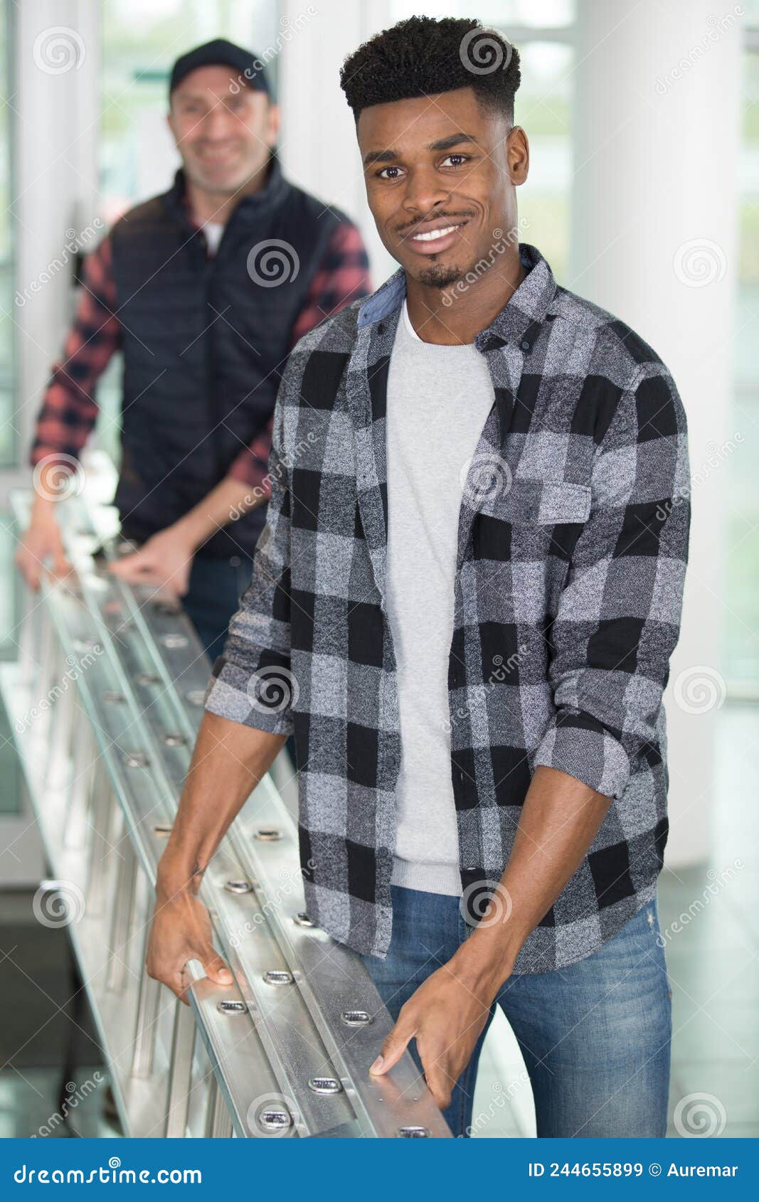 Cheerful Men Carrying Ladder Stock Image - Image of work, changing ...