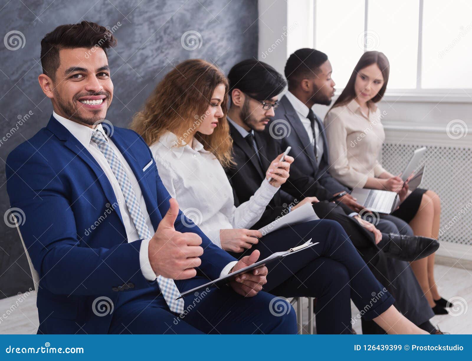 Cheerful Man Showing Thumb Up while Waiting in Queue Stock Image ...