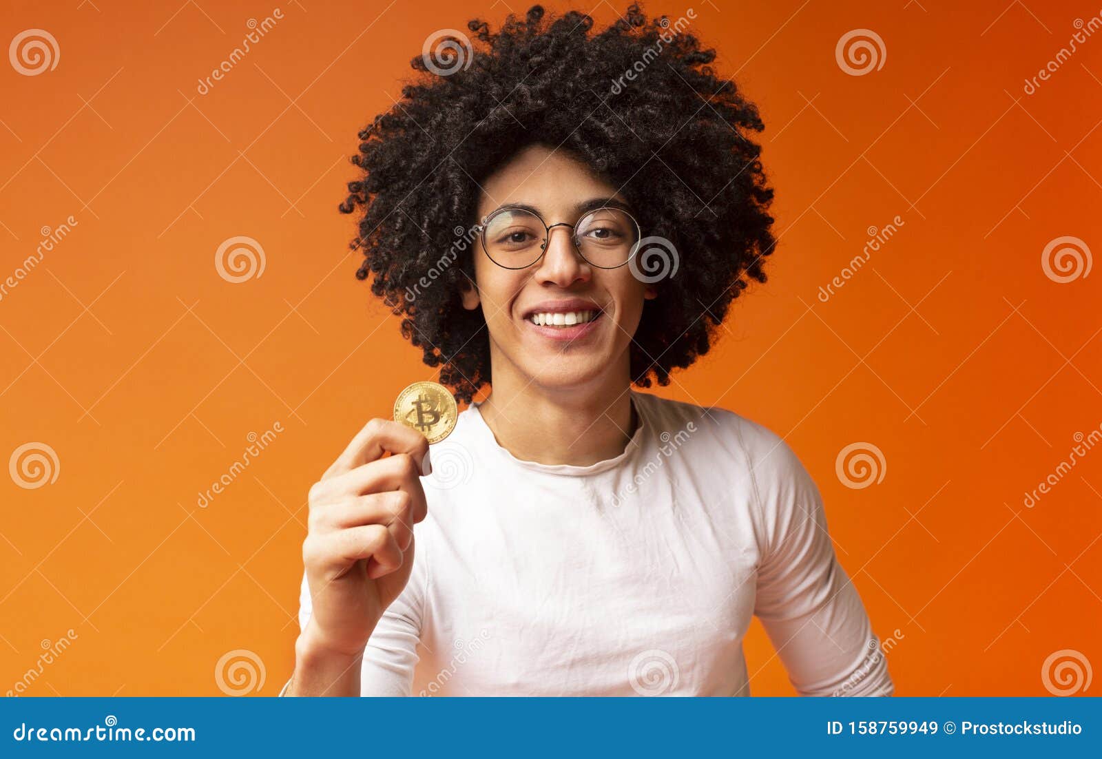 Cheerful Millennial Black Guy Holding Golden Bitcoin Stock Image ...