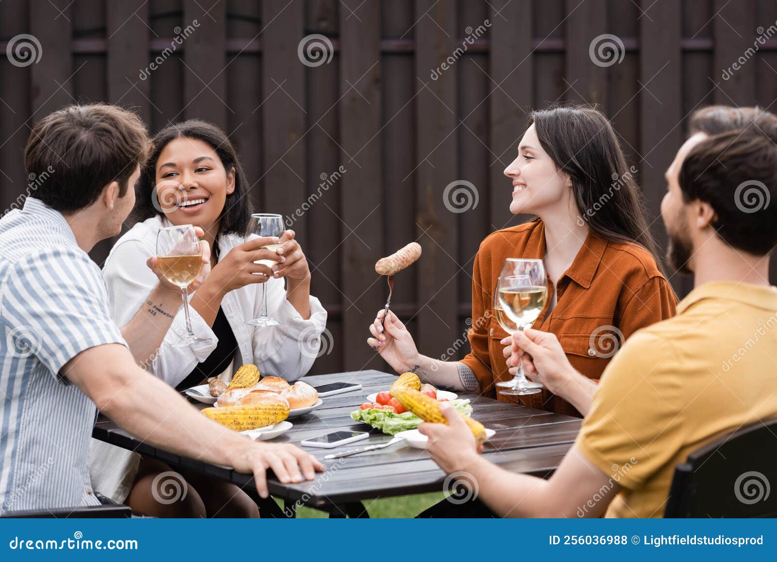 Cheerful Multiethnic Friends Holding Glasses with Stock Photo - Image ... Cheerful Multiethnic Friends Holding Glasses with Stock Photo - Image ...